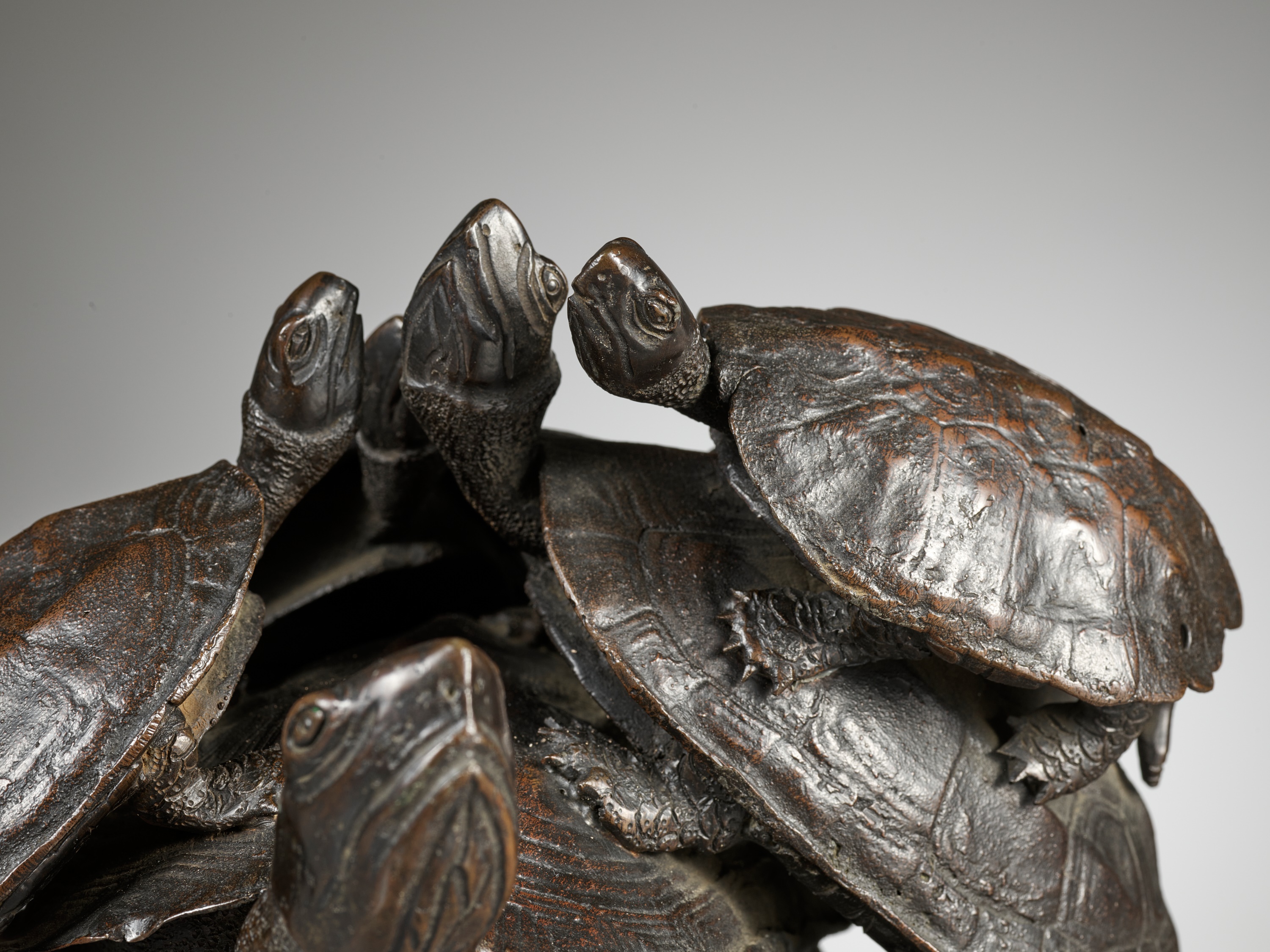 Lot 10 - A LARGE BRONZE OKIMONO OF FIVE TURTLES