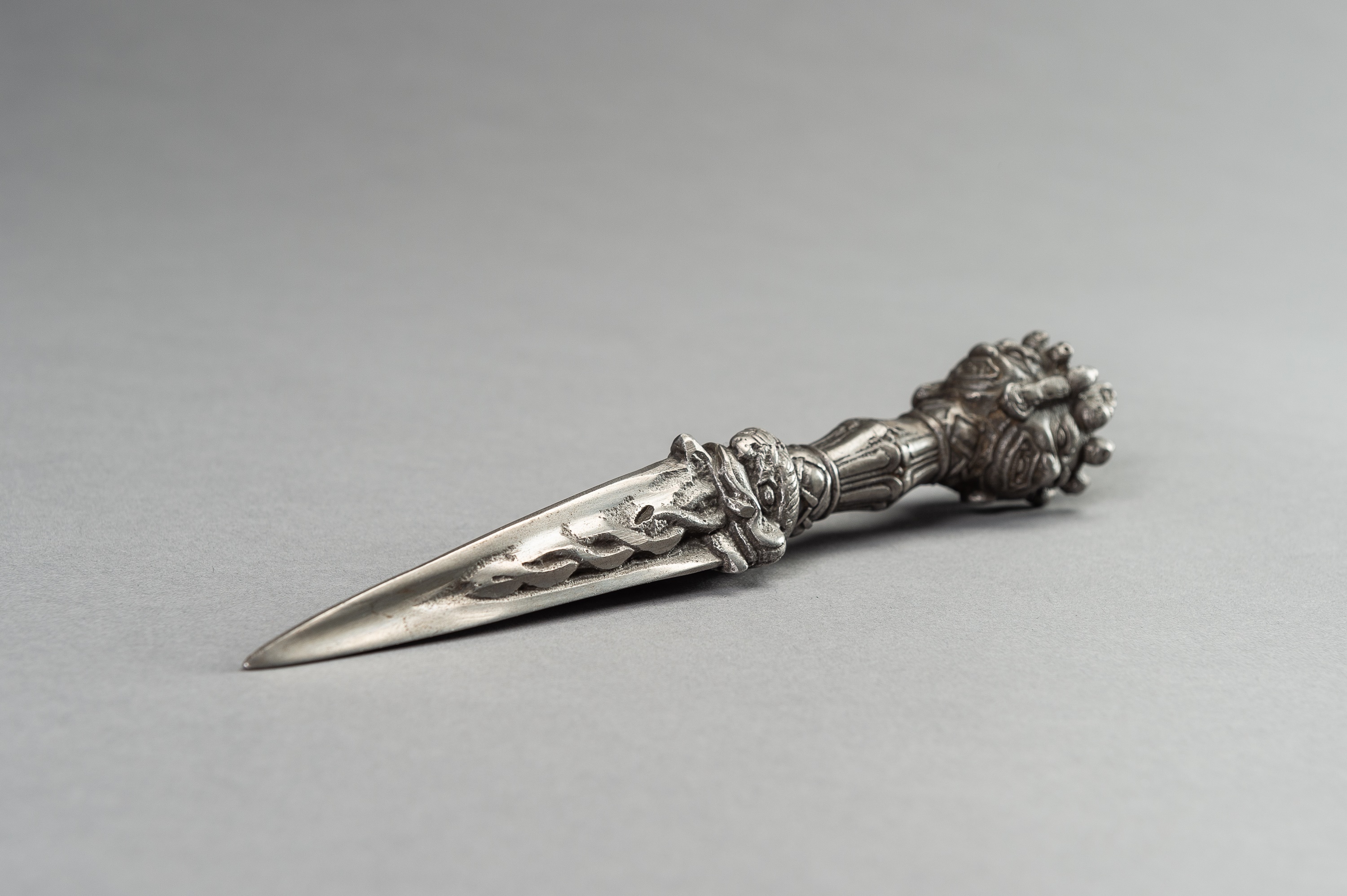 Lot 139 - AN IRON PHURBA