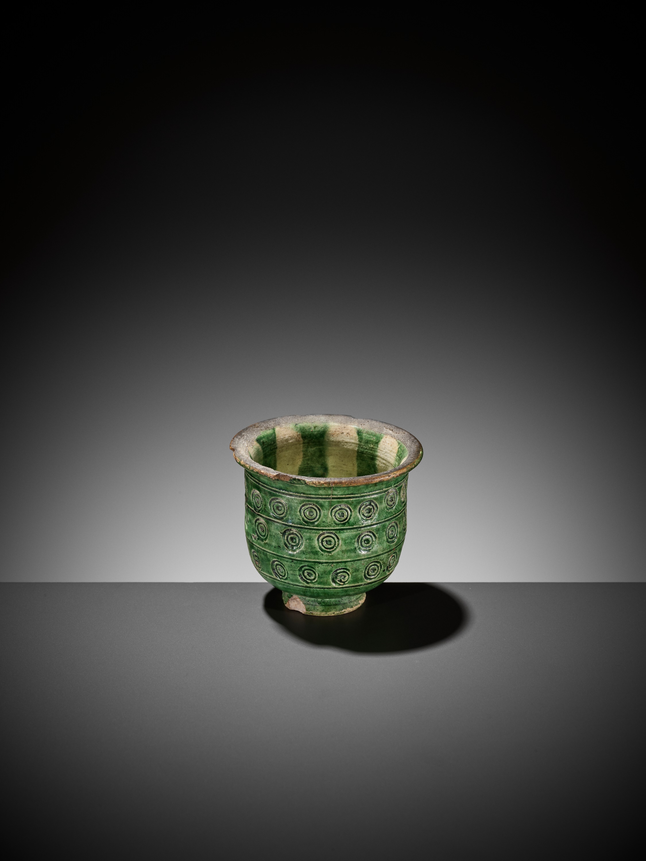 Lot 53 - A RARE GREEN-GLAZED BELL-SHAPED CUP, TANG