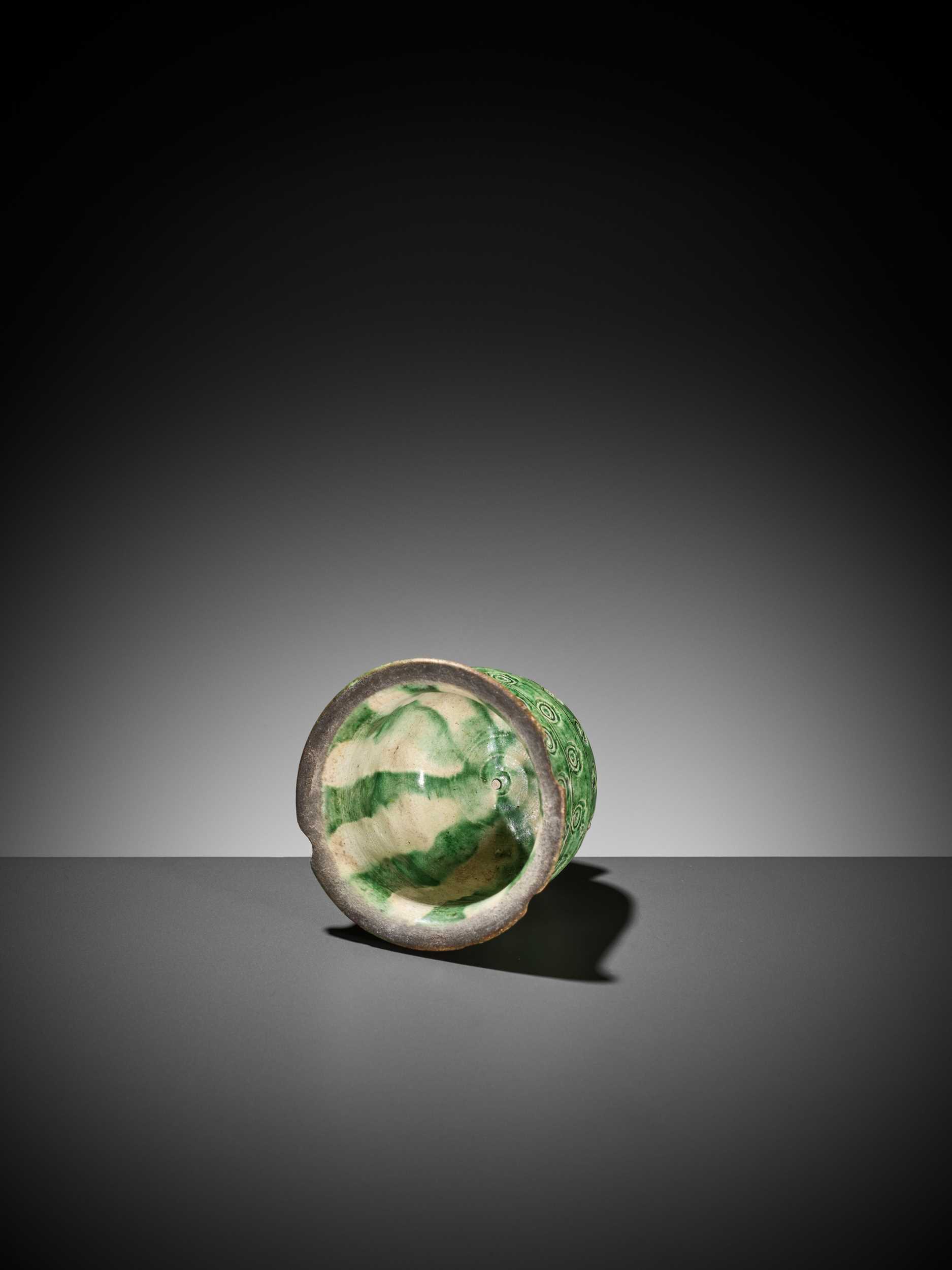 Lot 53 - A RARE GREEN-GLAZED BELL-SHAPED CUP, TANG