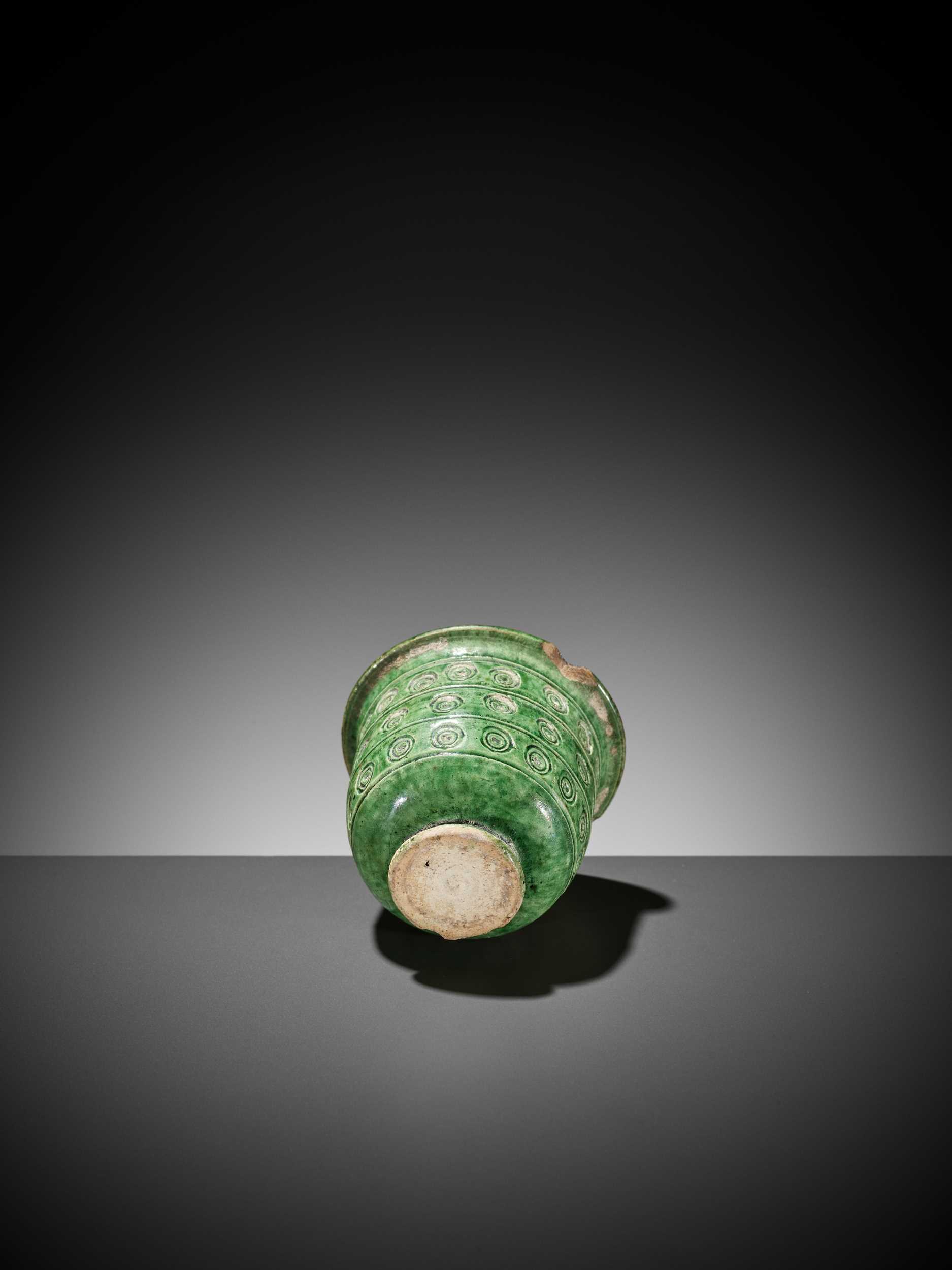 Lot 53 - A RARE GREEN-GLAZED BELL-SHAPED CUP, TANG