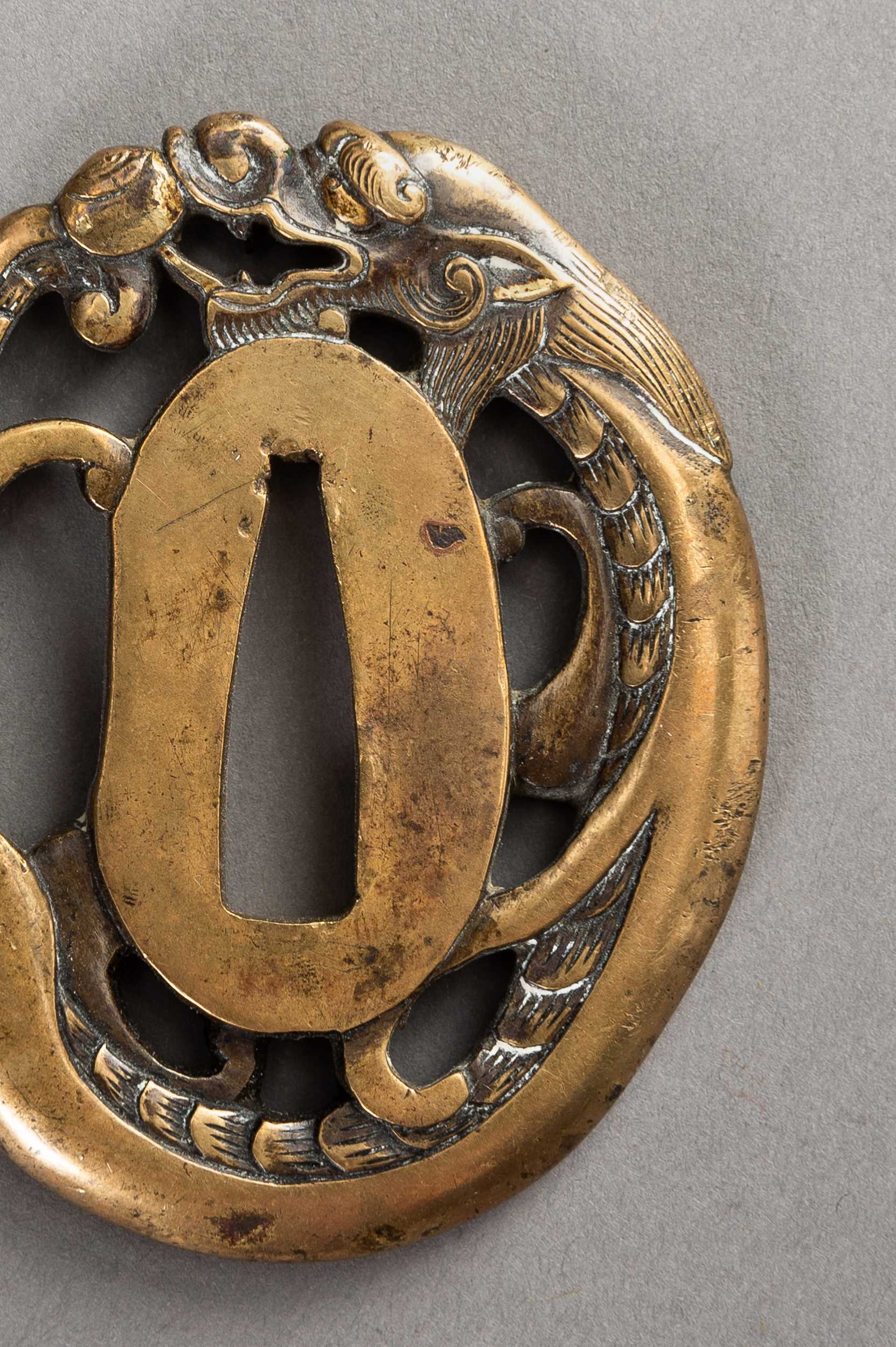 Lot 1365 - A SHINCHU TSUBA WITH DRAGON