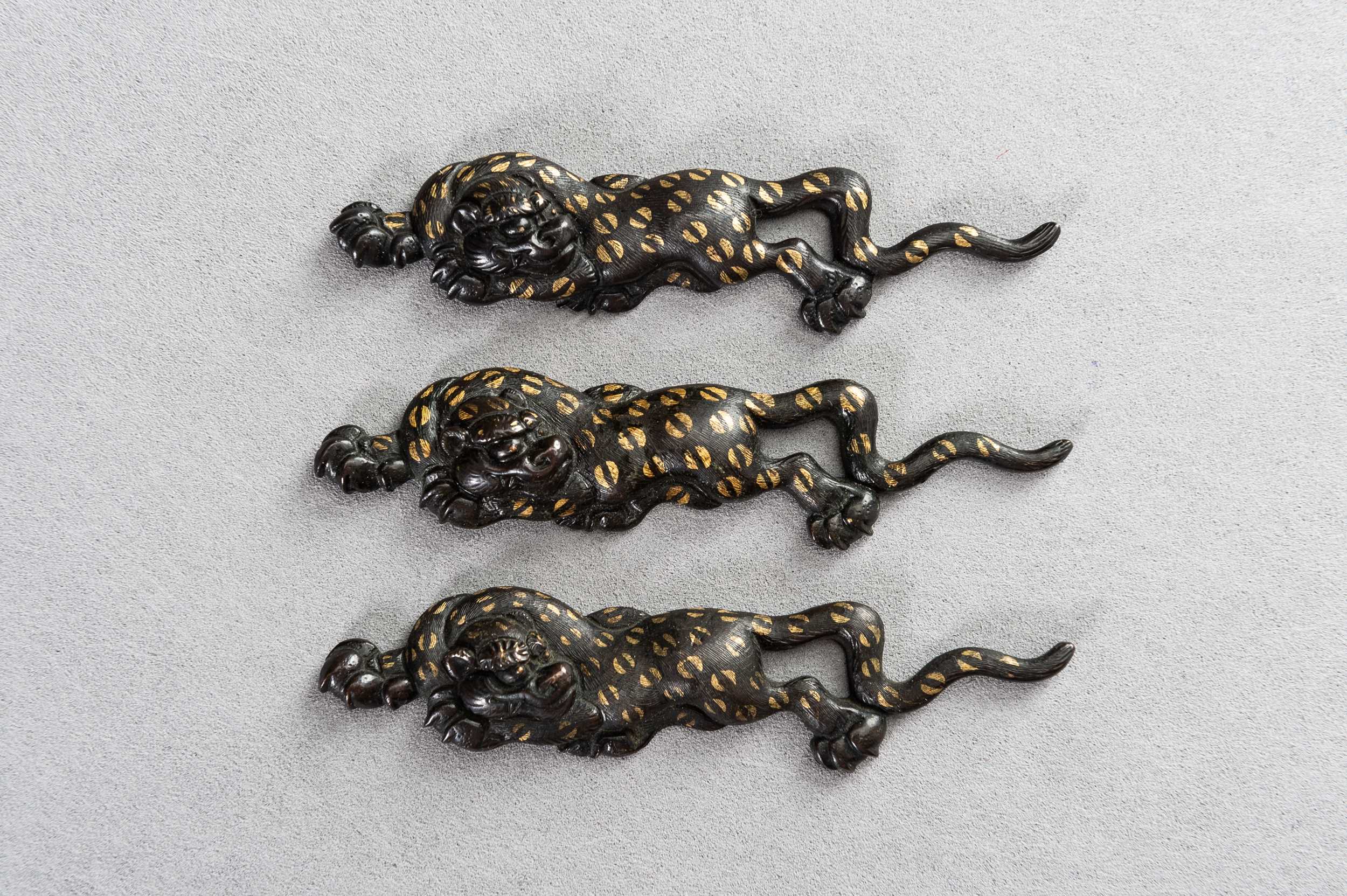 Lot 654 - A GROUP OF THREE LARGE SHAKUDO MENUKI