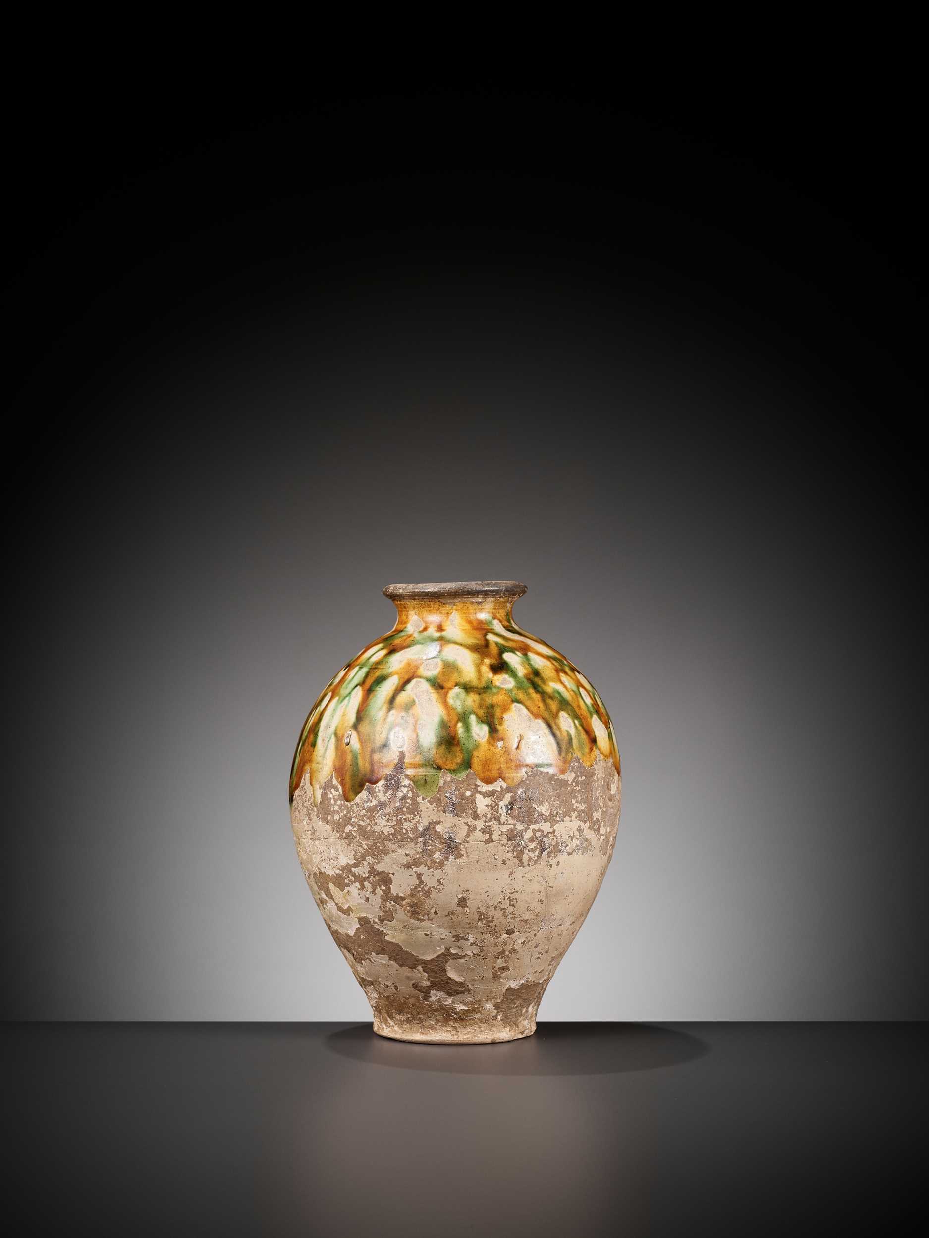 Lot 382 - A SANCAI GLAZED POTTERY JAR, TANG DYNASTY