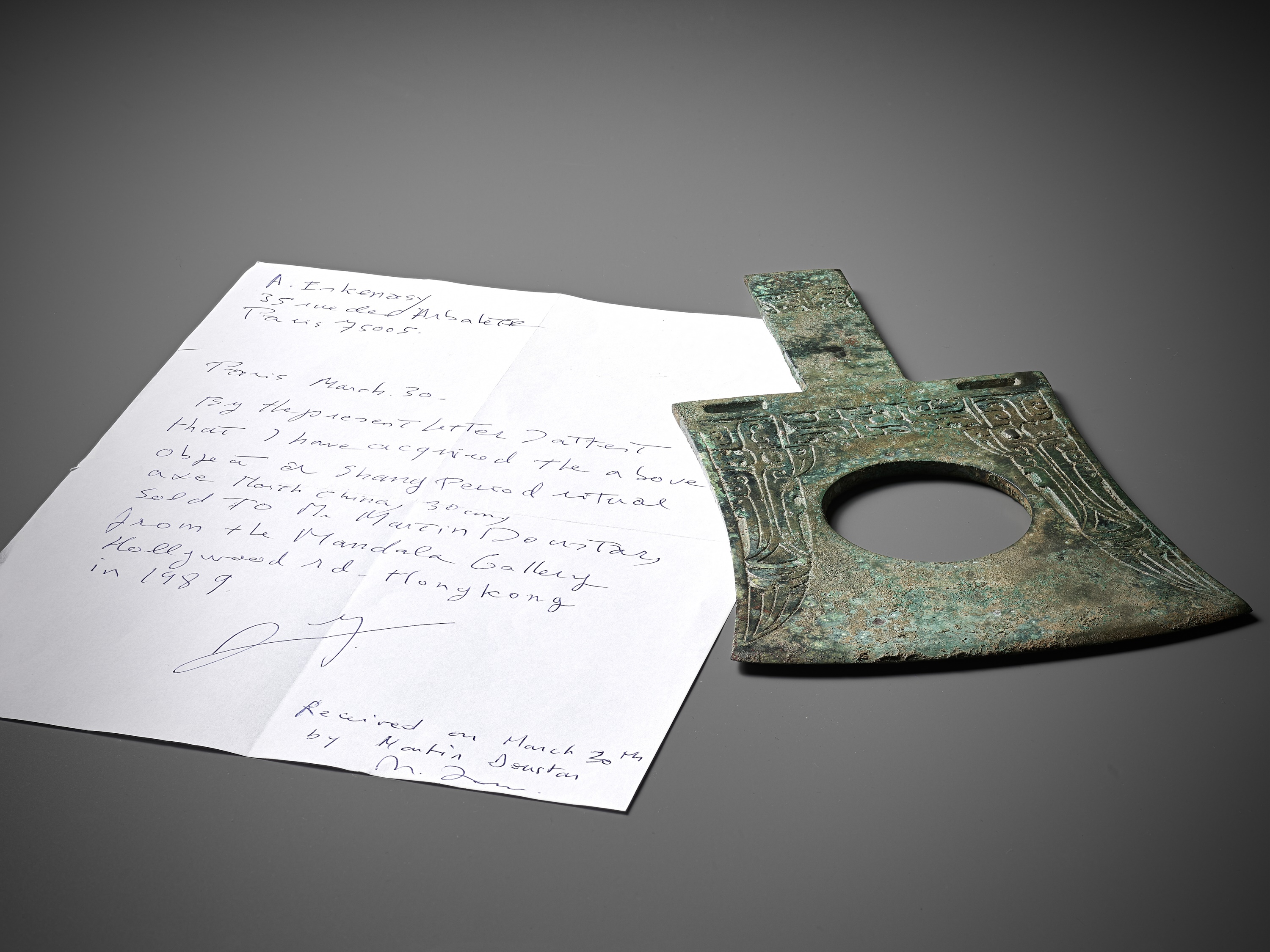 Lot 1 - A RARE AND IMPORTANT BRONZE RITUAL AXE-HEAD,