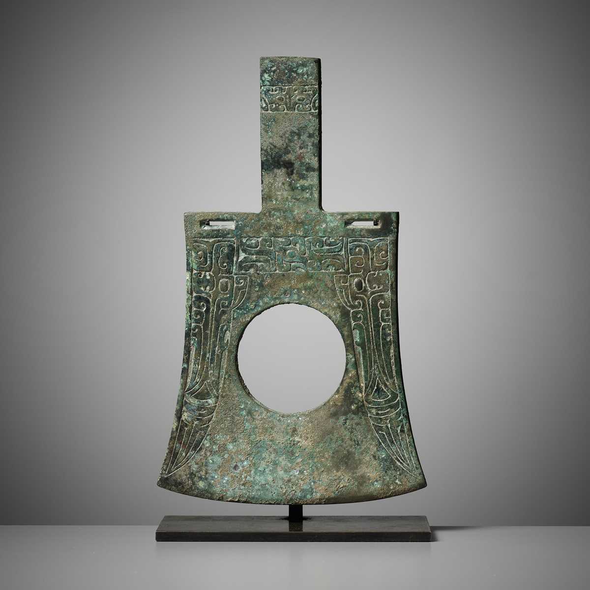 Lot 1 - A RARE AND IMPORTANT BRONZE RITUAL AXE-HEAD,