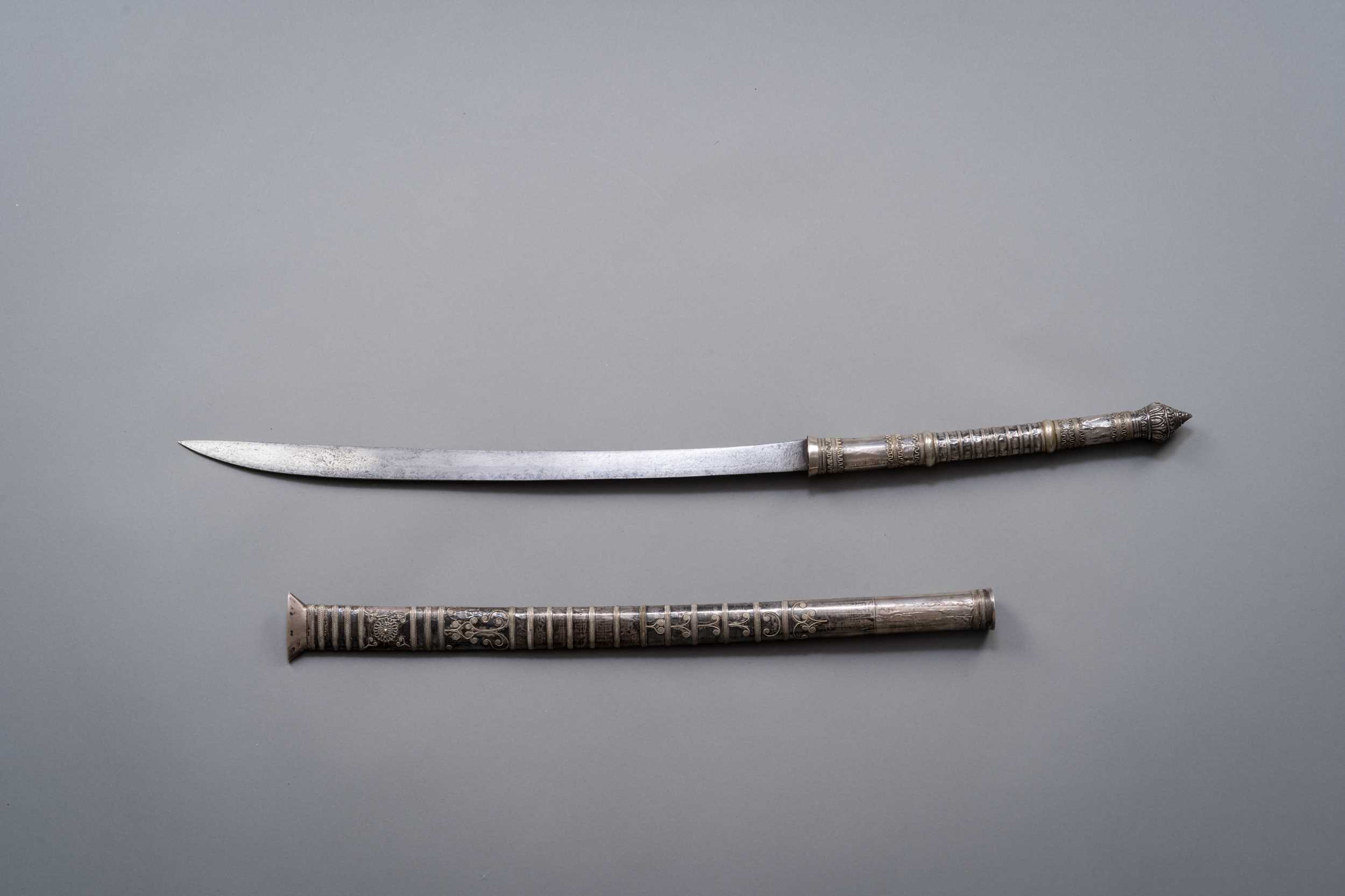 Lot 1234 - A BURMESE DHA SWORD, 19TH CENTURY