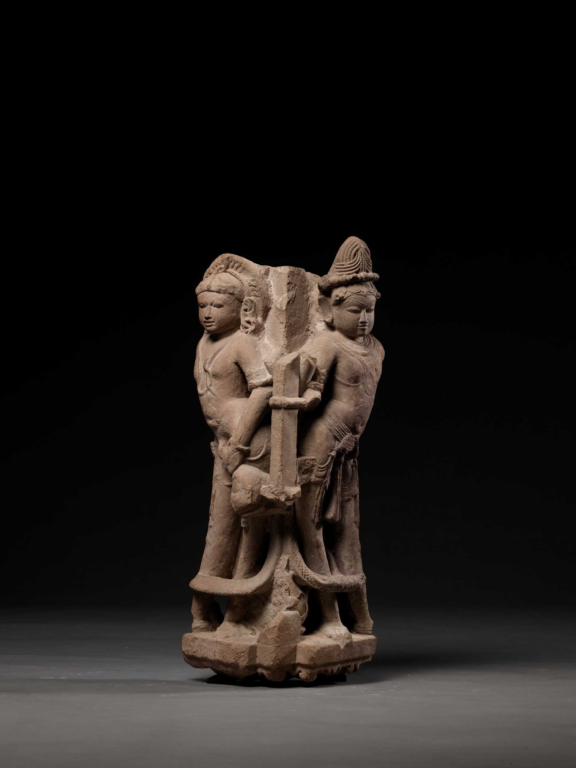 Lot 700 - A PINK SANDSTONE ARCHITECTURAL CORNER