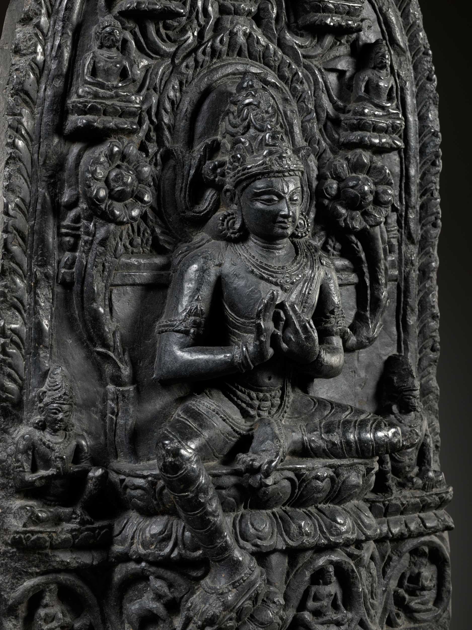 Lot 698 - A BLACK STONE STELE OF AN AVALOKITESHVARA