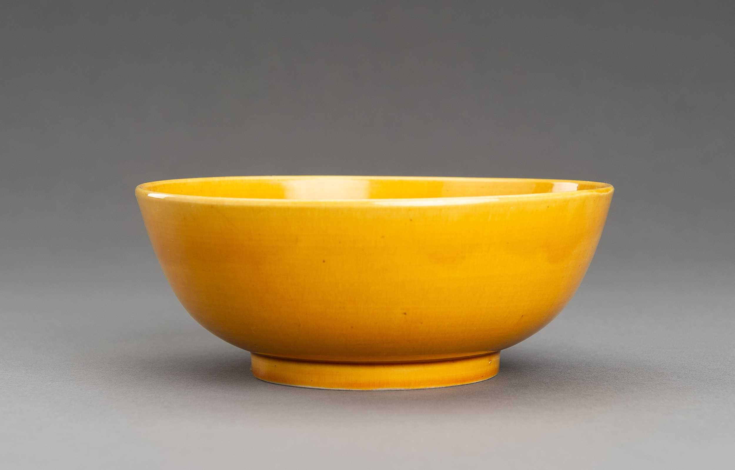 Lot 349 - A FINE YELLOW-GLAZED PORCELAIN BOWL