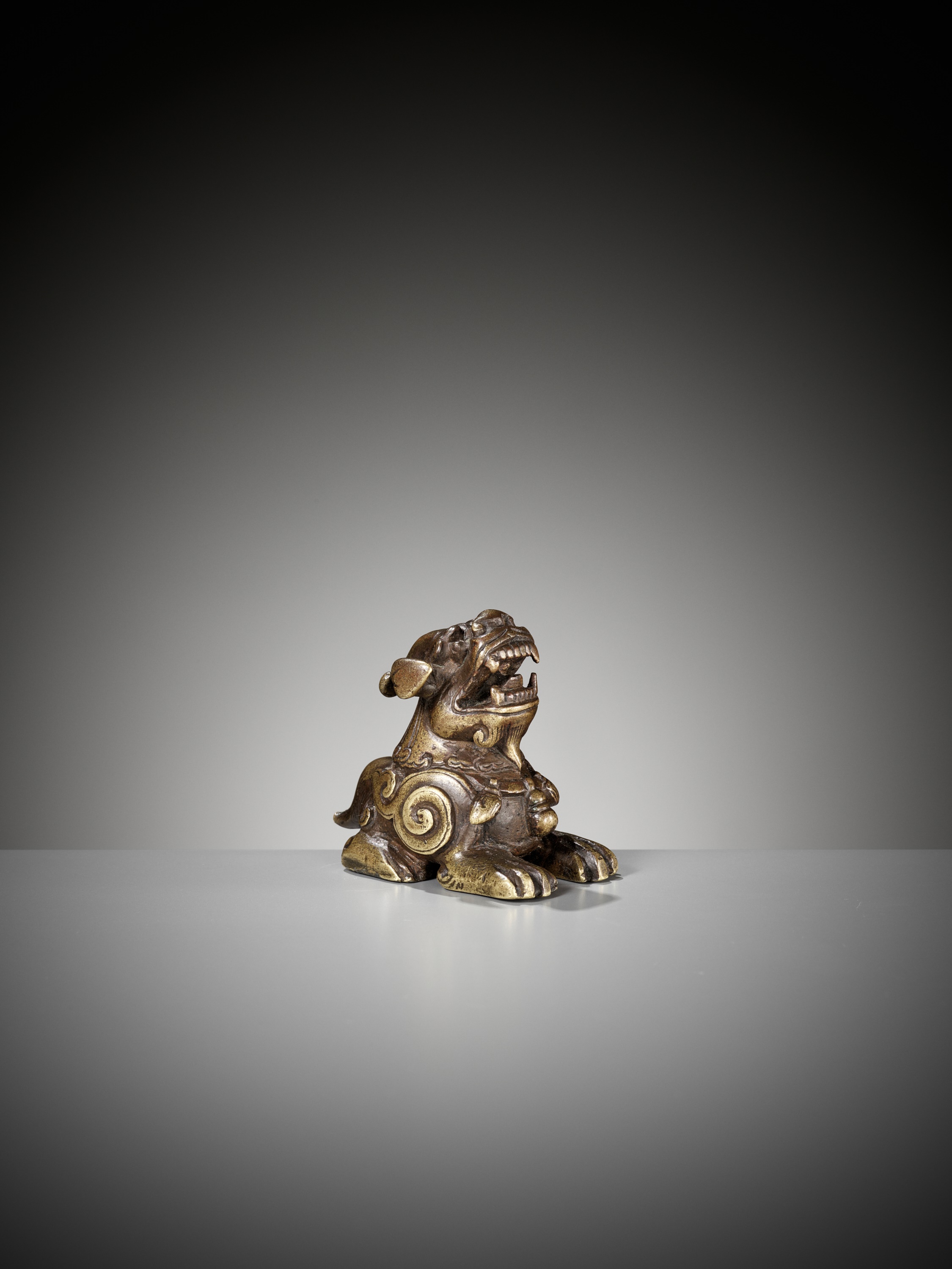 Lot 24 - A BRONZE ‘LUDUAN’ WEIGHT, 17TH CENTURY