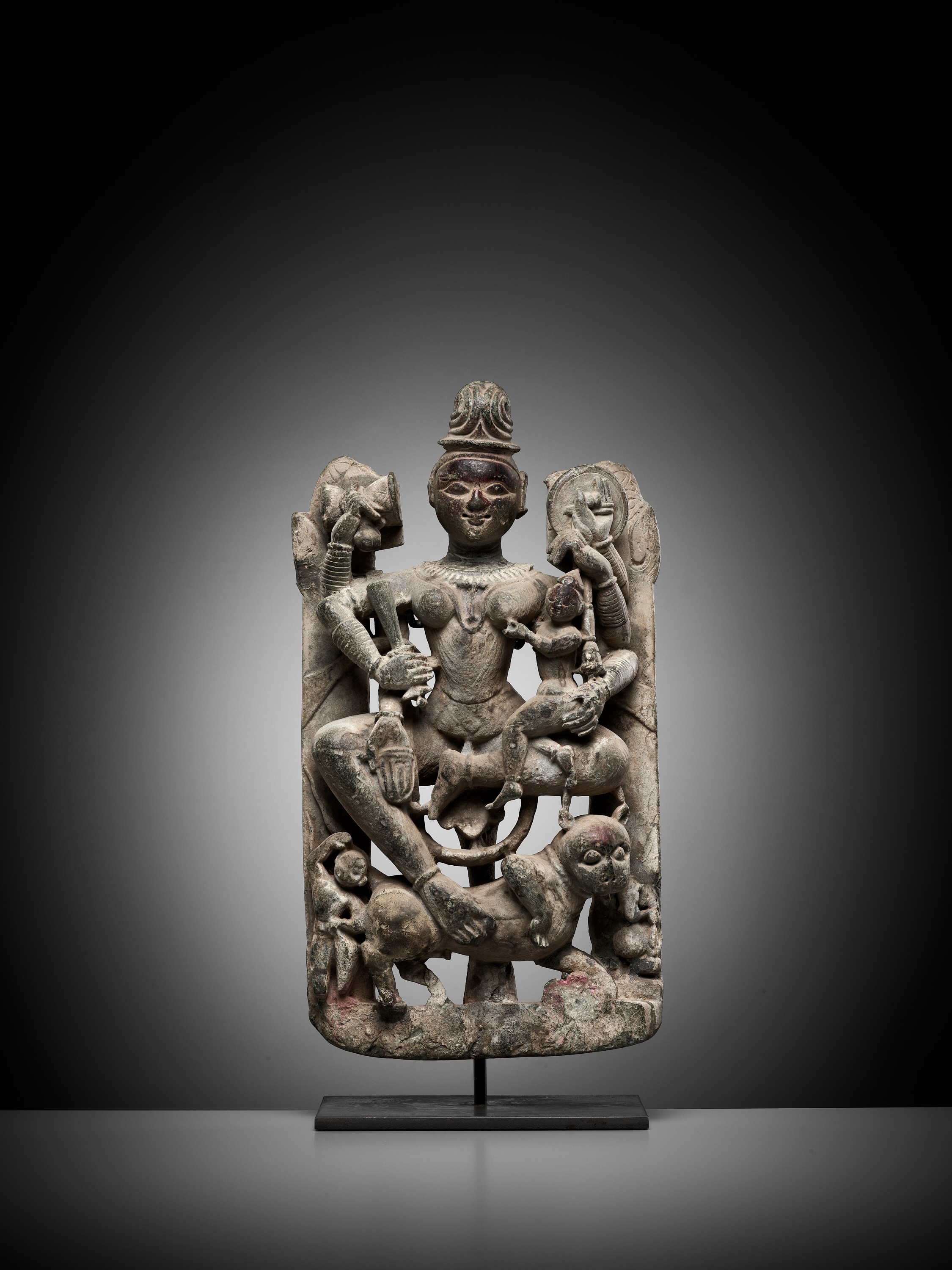 Lot 704 - A GRAY SCHIST RELIEF OF THE JAIN GODDESS