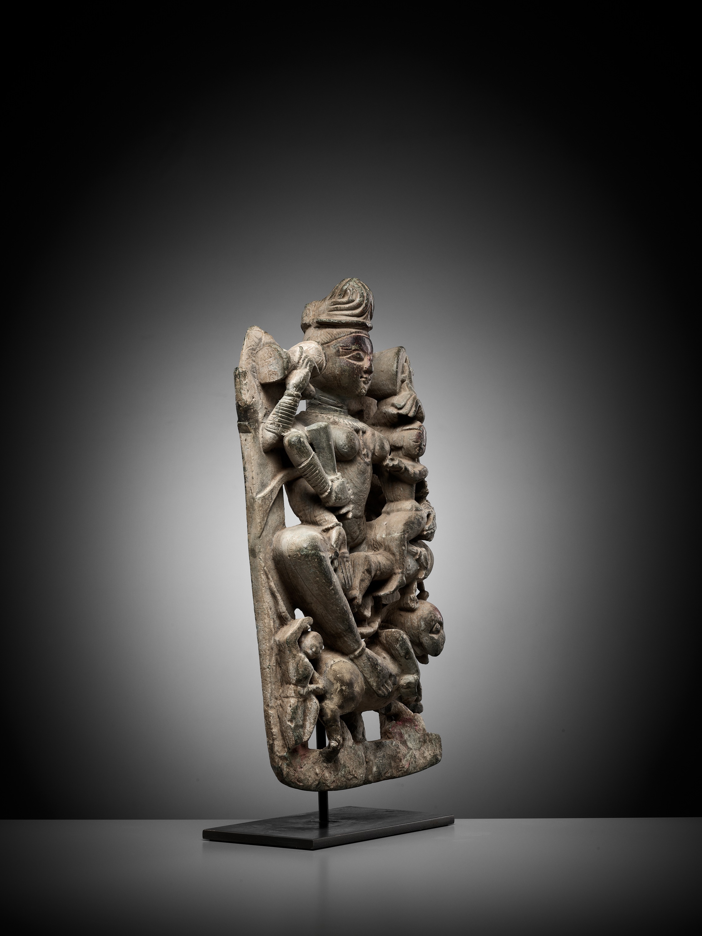 Lot 704 - A GRAY SCHIST RELIEF OF THE JAIN GODDESS
