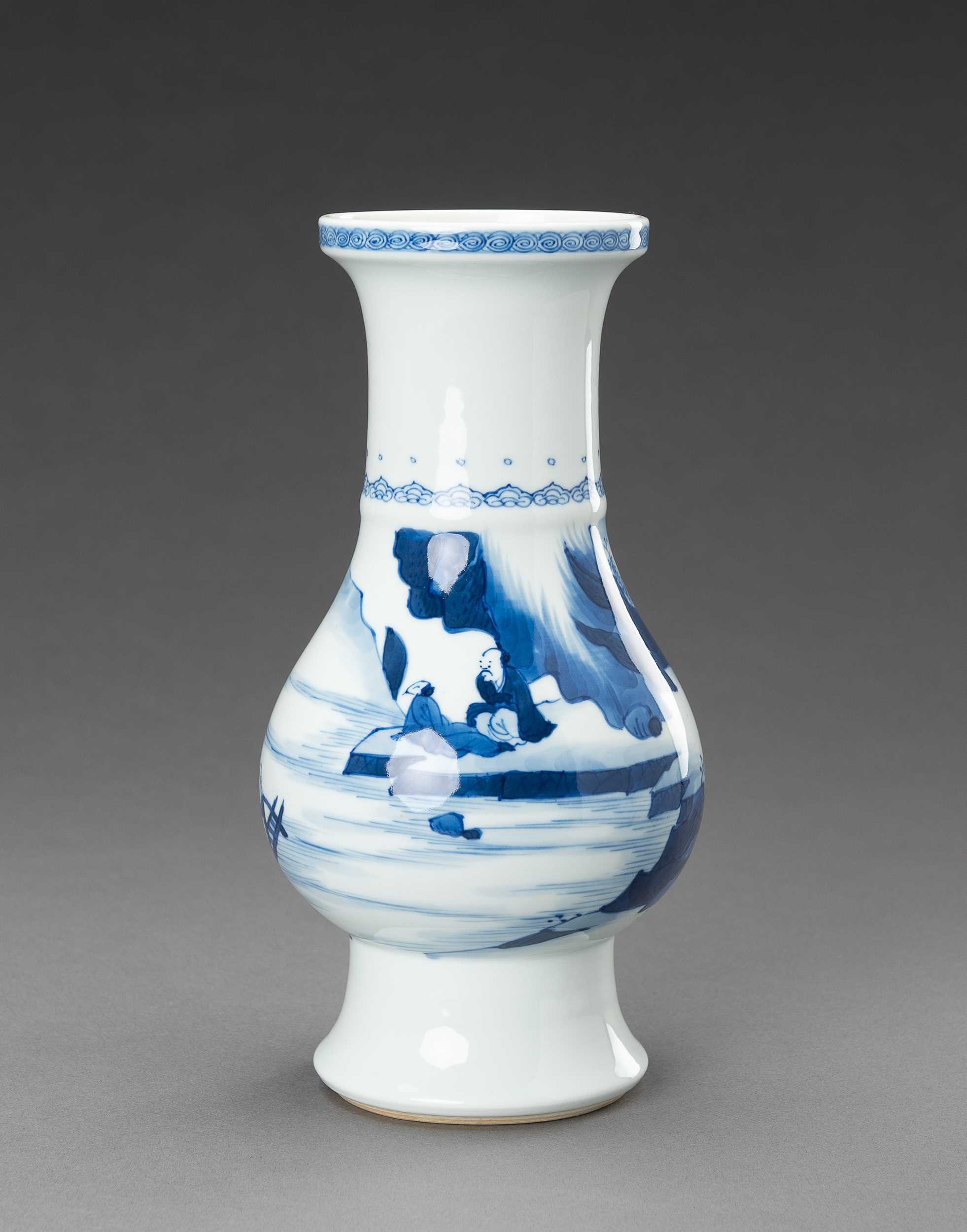 Lot 714 - A BLUE AND WHITE ‘TRAVERSING THE RIVER’