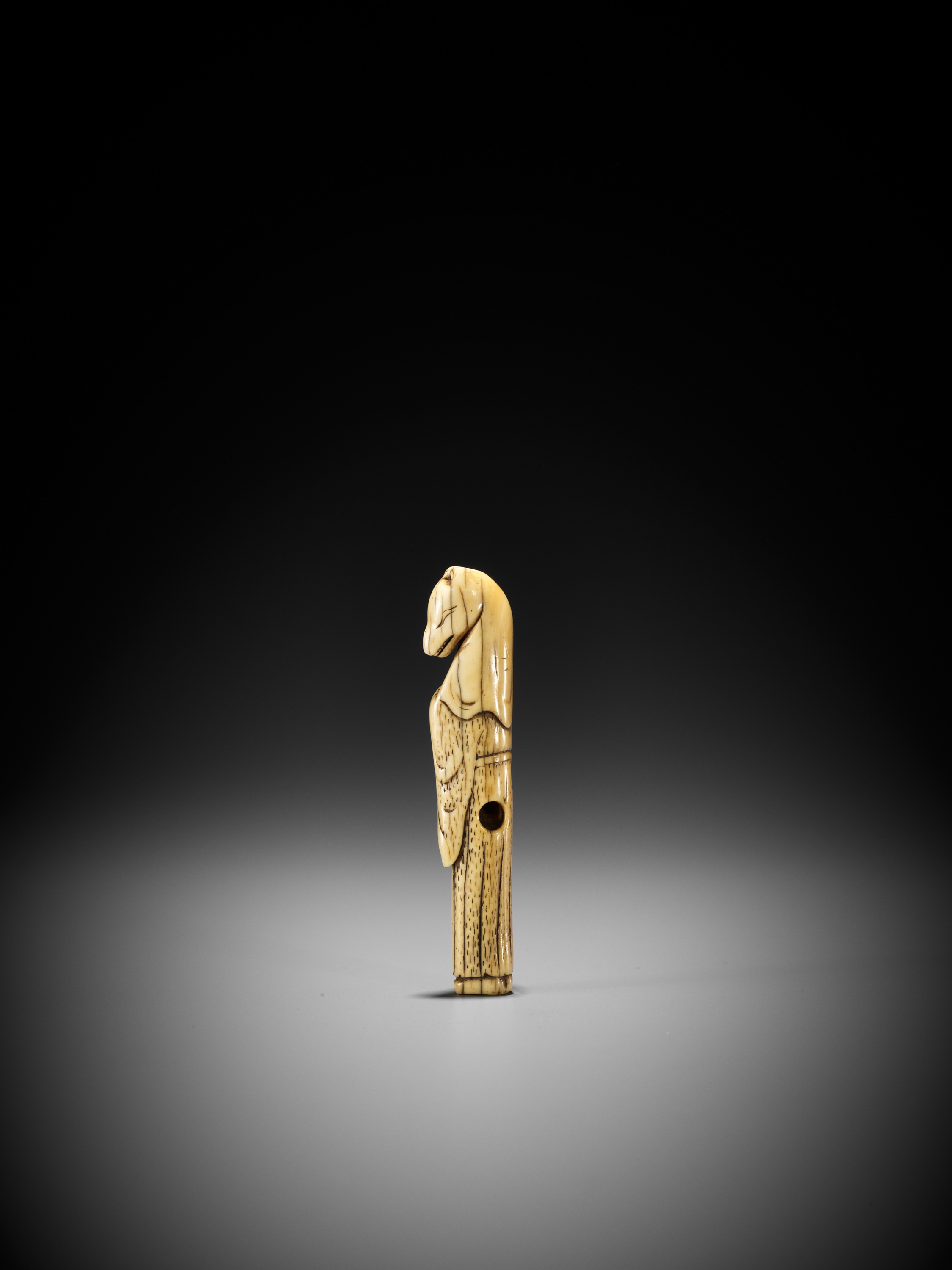 Lot 6 - A TALL IVORY NETSUKE OF A FOX PRIEST