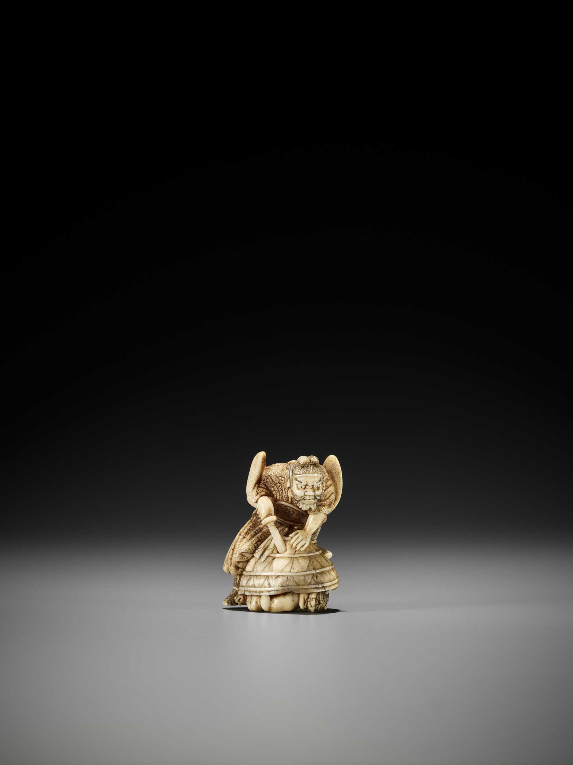 Lot 210 - HIDEMASA: AN AMUSING IVORY NETSUKE OF SHOKI