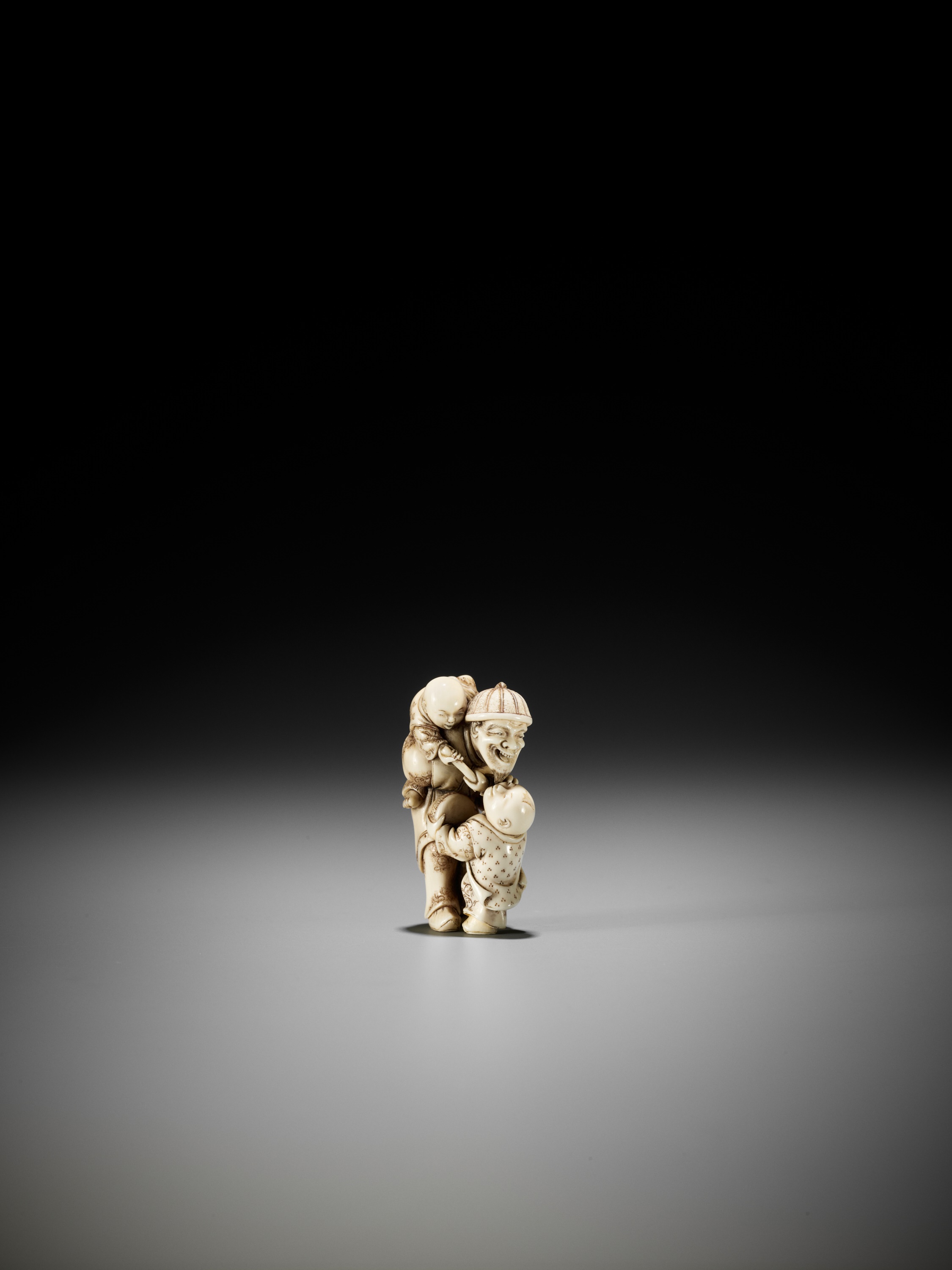 Lot 1419 - HIDEMASA: AN IVORY NETSUKE OF A DUTCHMAN