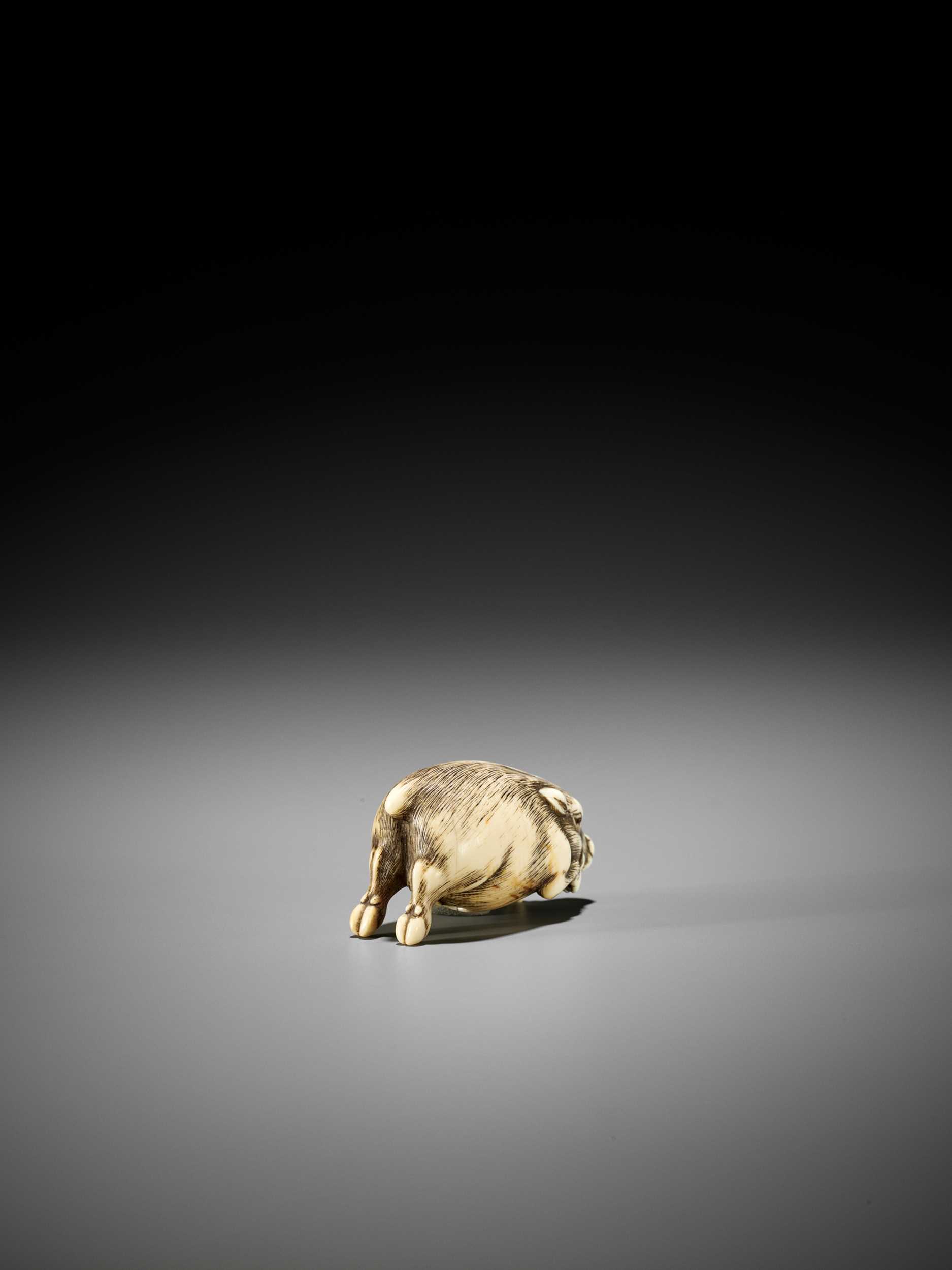 Lot 19 - OKAKOTO: A RARE IVORY NETSUKE OF A RUNNING