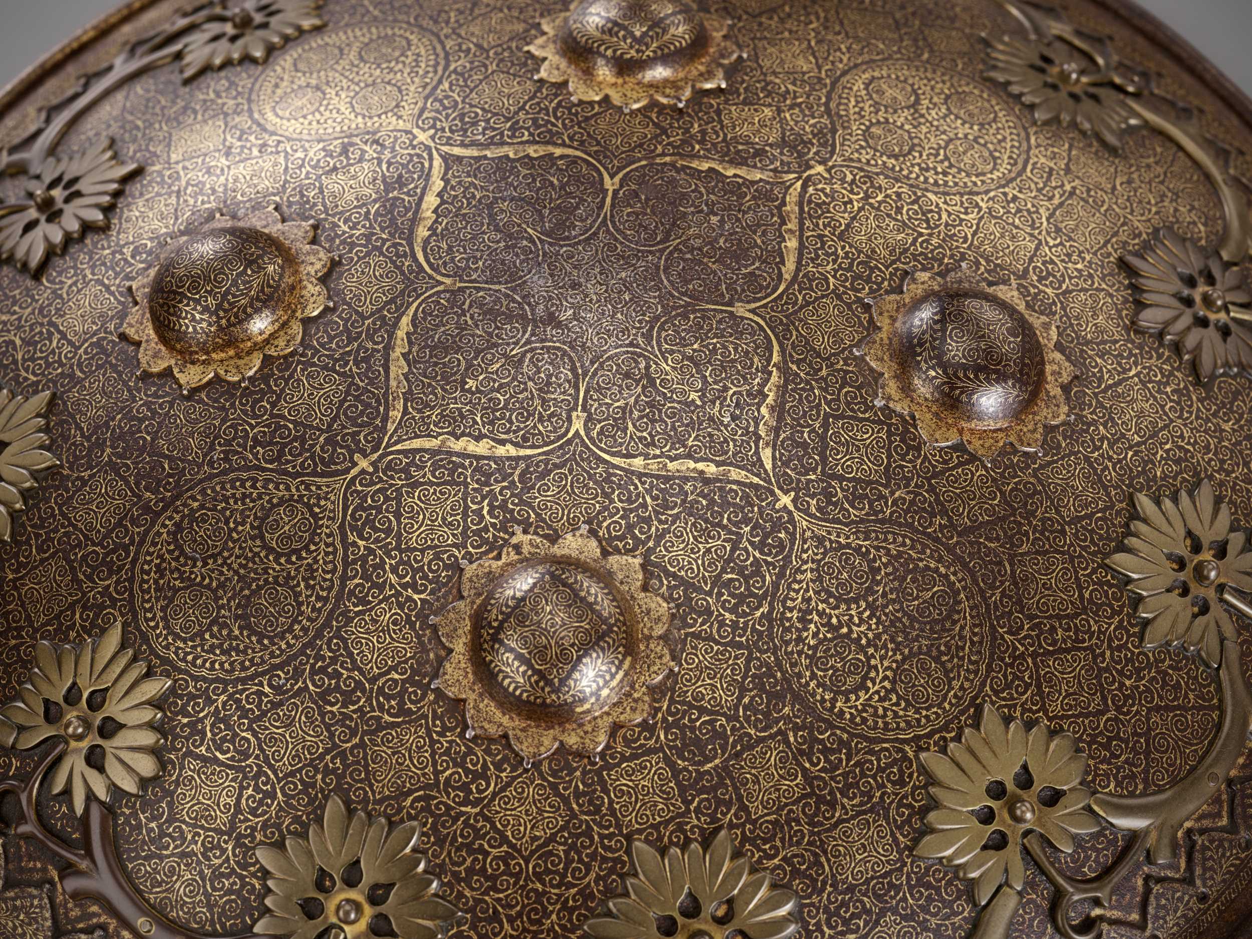 Lot 712 - A MUGHAL STYLE IRON CEREMONIAL SHIELD,