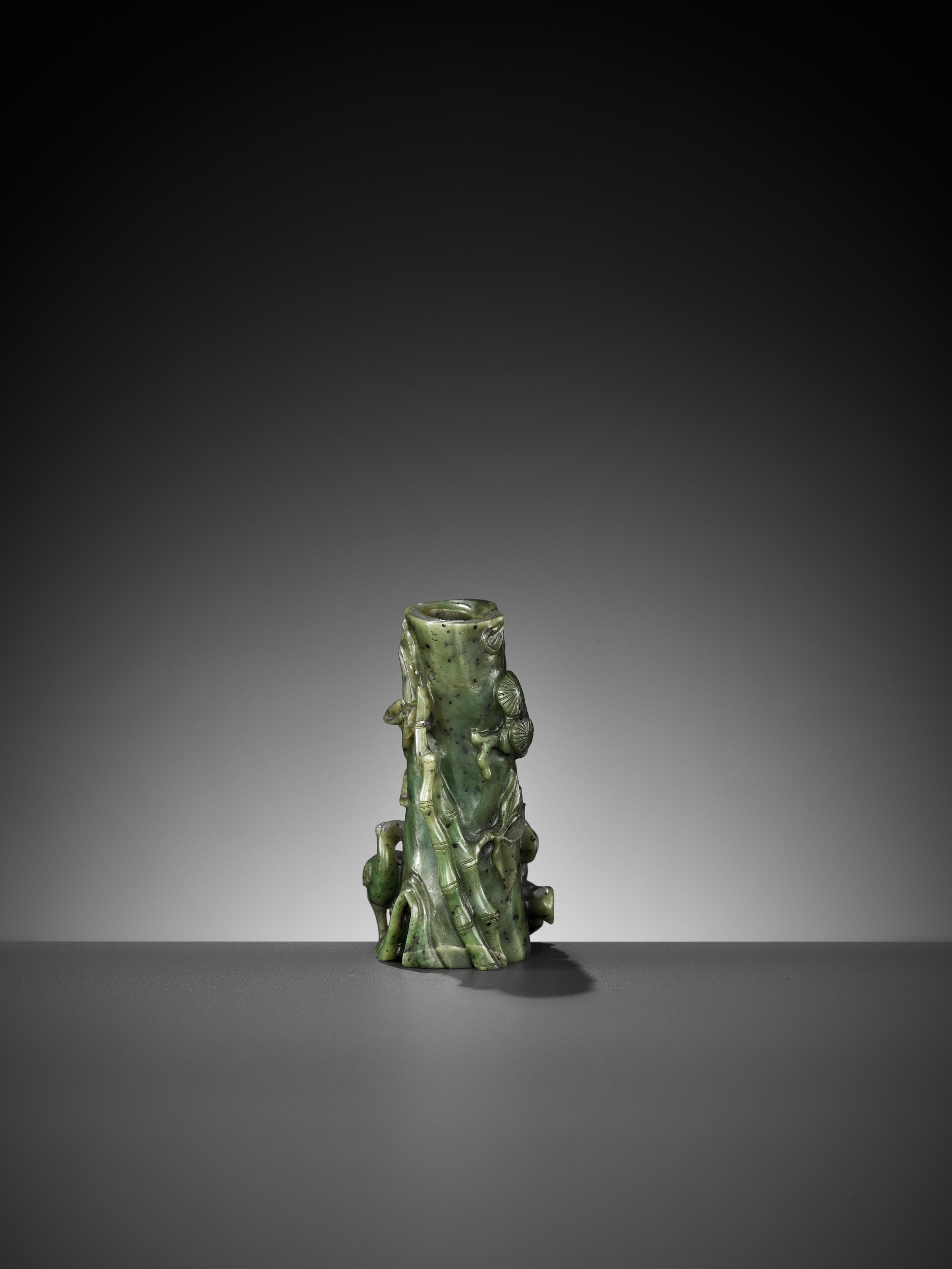 Lot 352 - A SPINACH GREEN JADE ‘PINE, LINGZHI AND