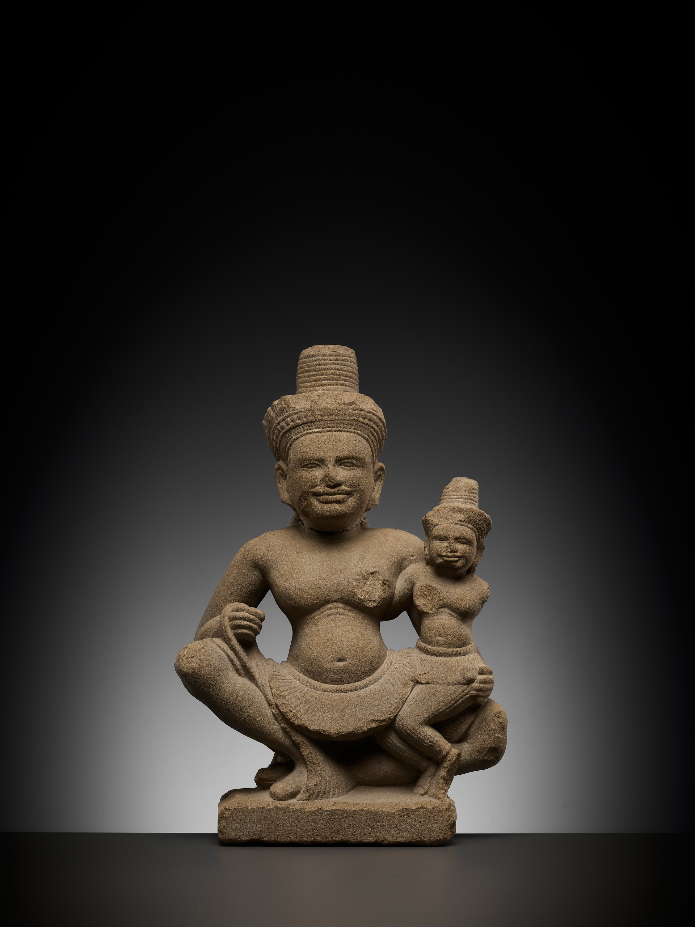 Lot 657 - A RARE SANDSTONE FIGURE OF SHIVA AND SKANDA,