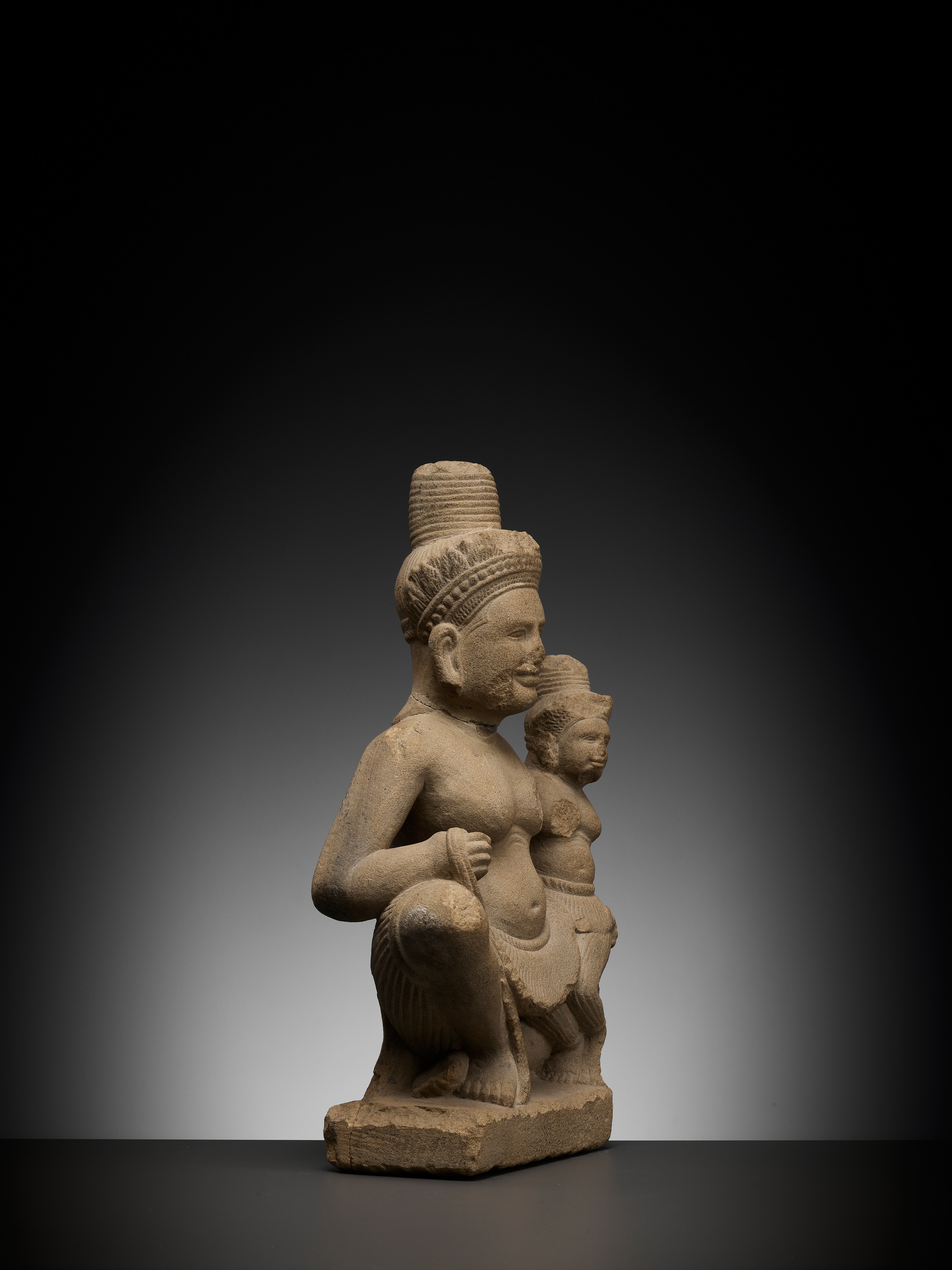 Lot 657 - A RARE SANDSTONE FIGURE OF SHIVA AND SKANDA,
