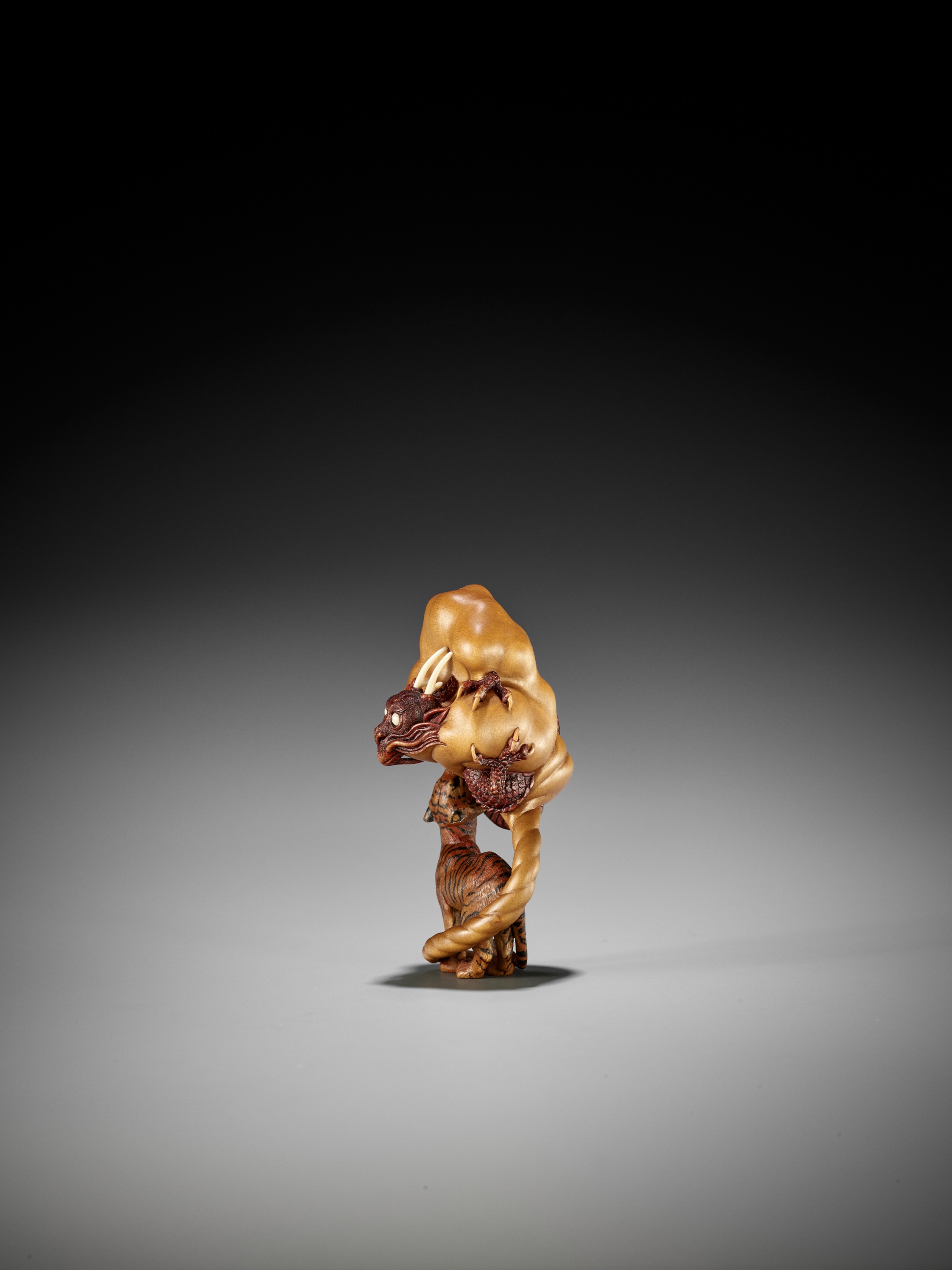 Lot 276 - NICK LAMB: A STAINED BOXWOOD ‘TIGER AND