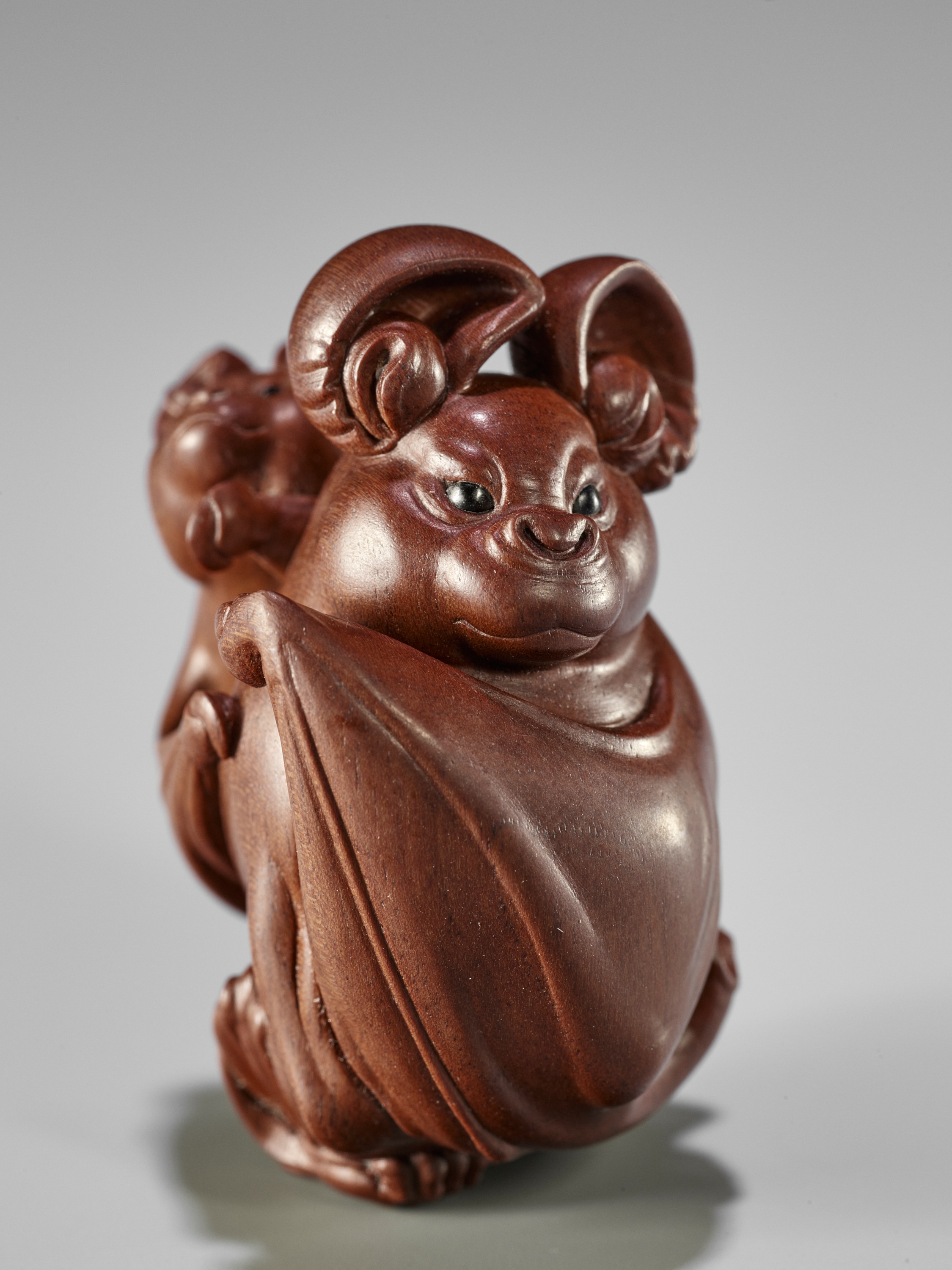 Lot 164 - KENJI: A FINE CONTEMPORARY WOOD NETSUKE OF A