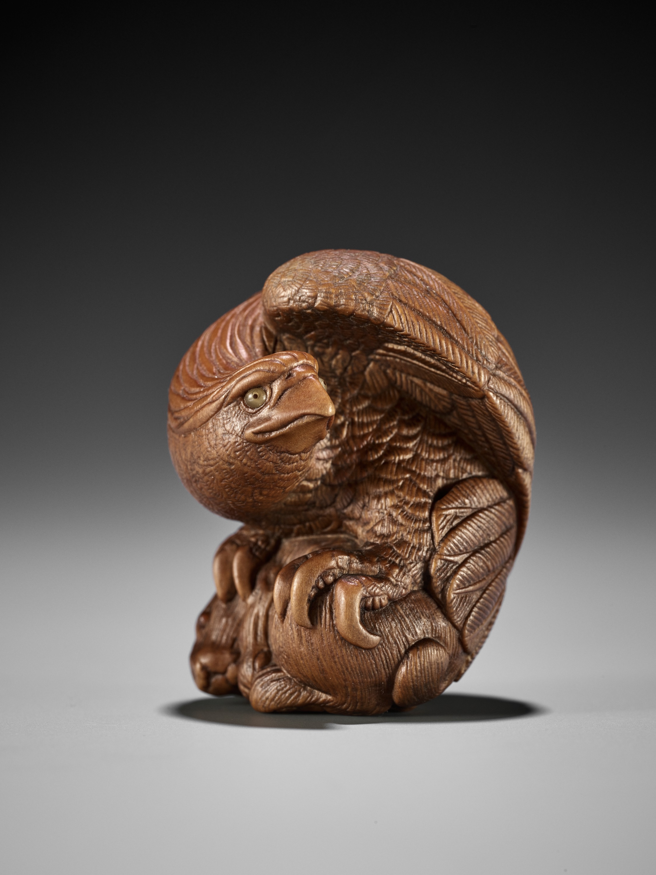 Lot 162 - BISHU: A FINE CONTEMPORARY WOOD NETSUKE OF