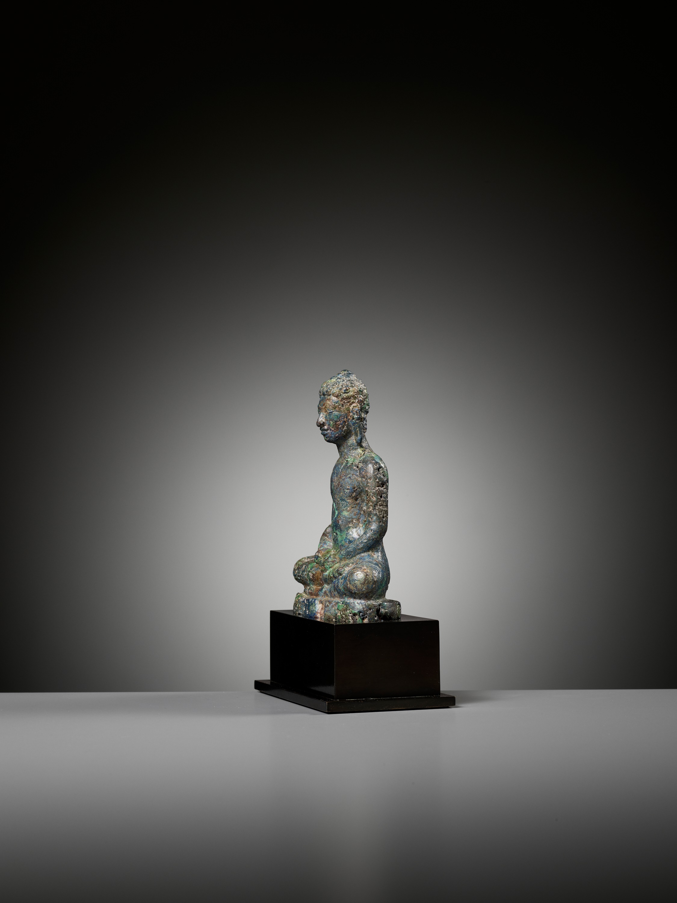 Lot 231 - A BRONZE FIGURE OF BUDDHA, PRE-ANGKOR PERIOD