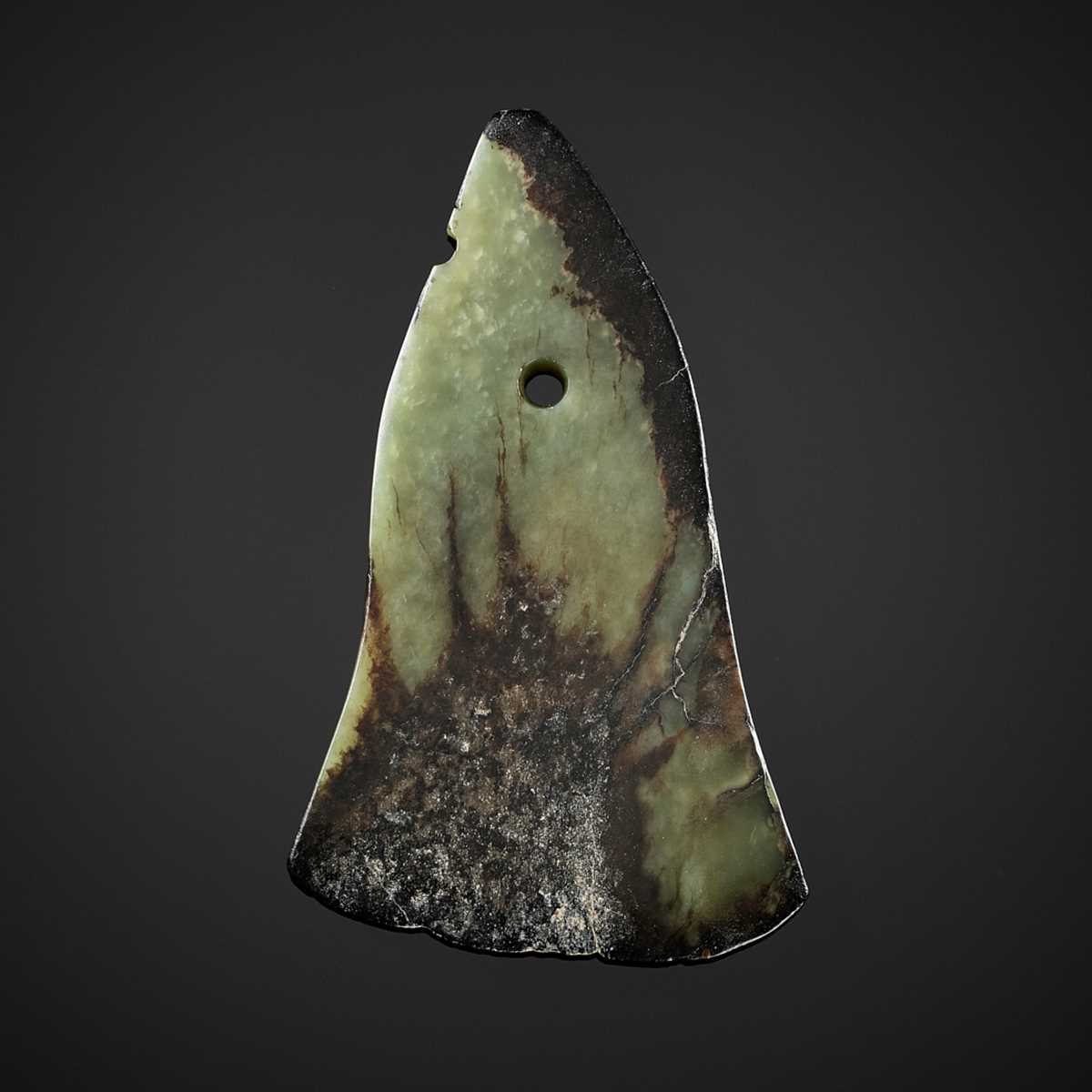 A RARE GREEN AND BROWN JADE AXE, QIJIA CULTURE