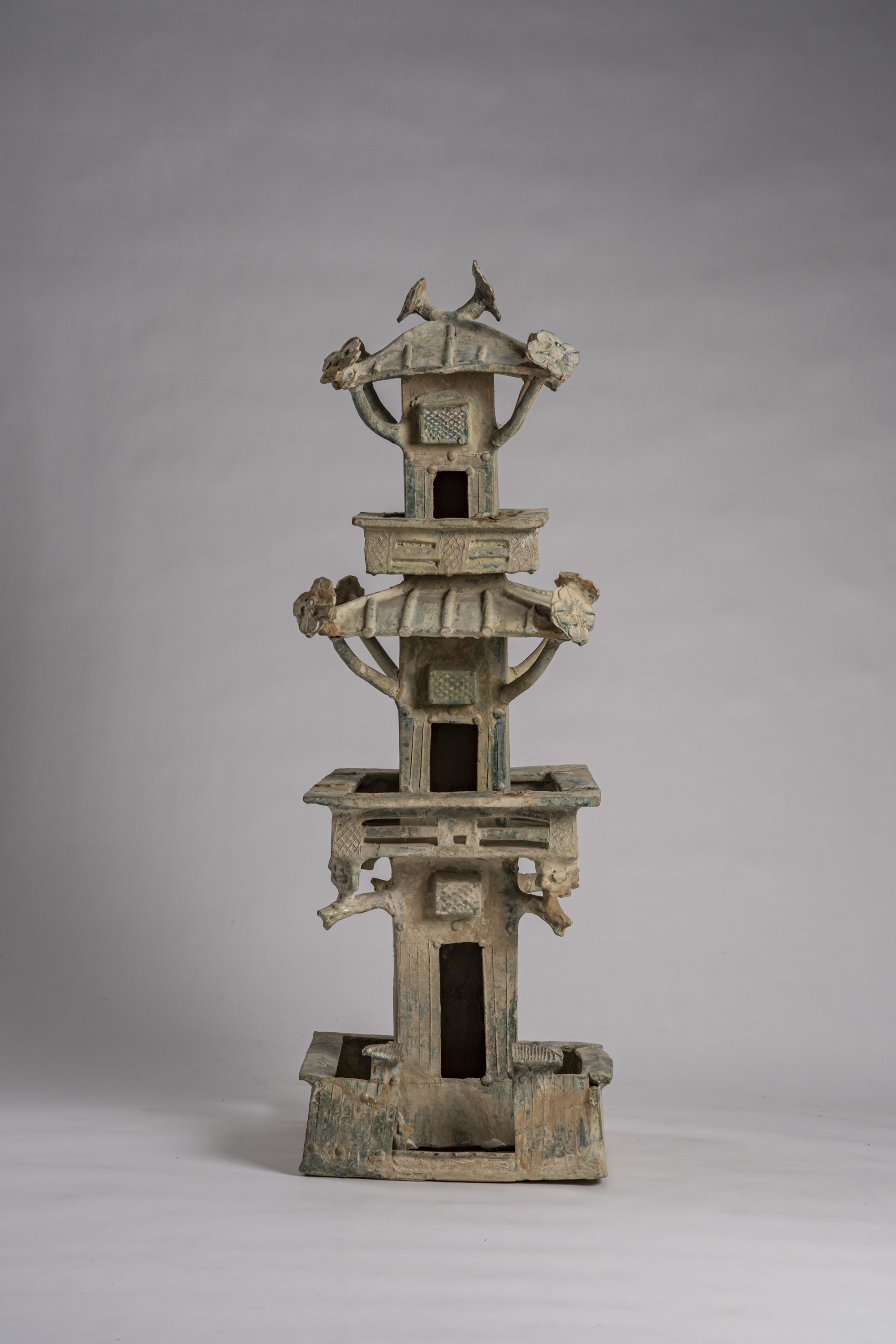 Lot 517 - A GREEN GLAZED CERAMIC MODEL OF A WATCHTOWER,