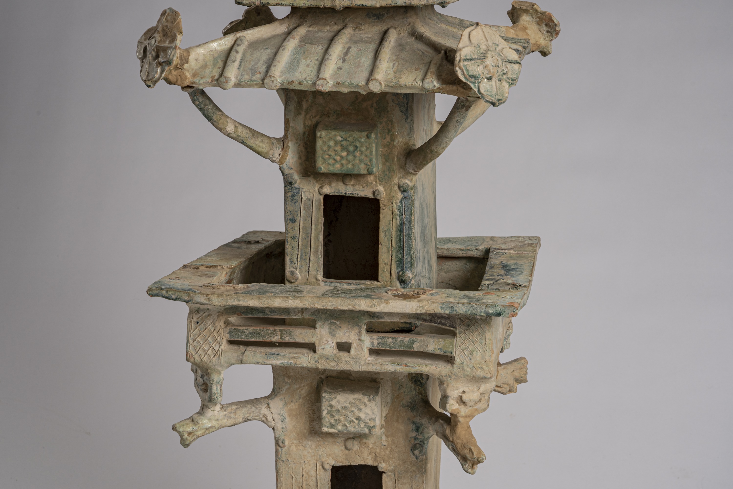Lot 517 - A GREEN GLAZED CERAMIC MODEL OF A WATCHTOWER,