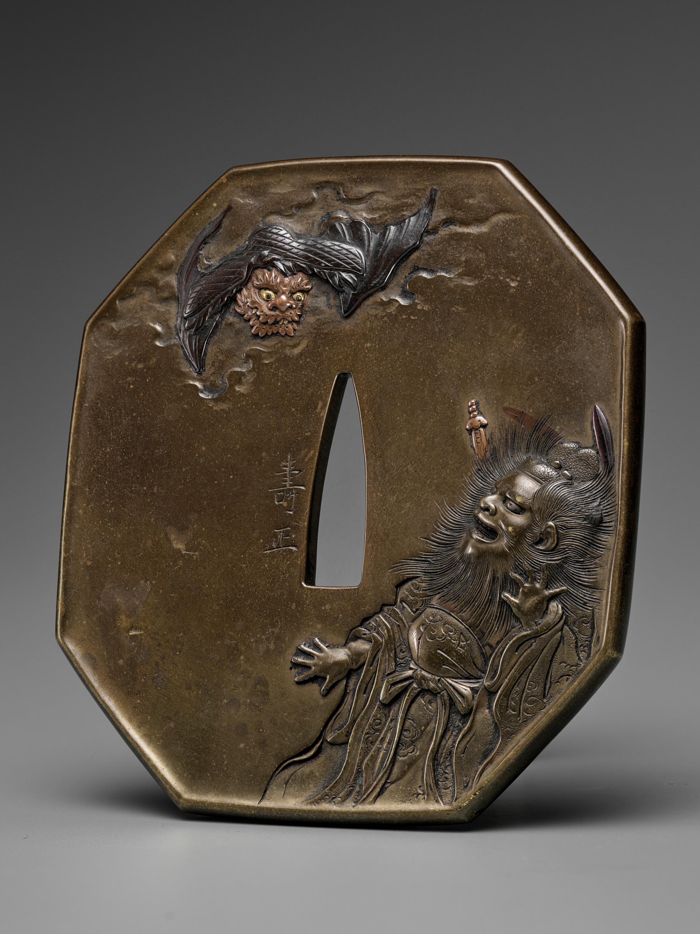 Lot 146 - TOSHIMASA: A SUPERB SENTOKU TSUBA DEPICTING