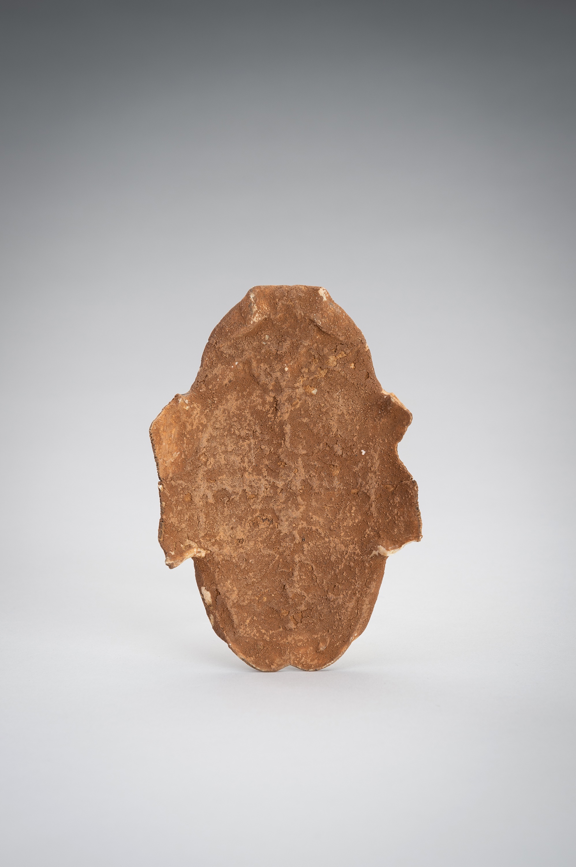 Lot 63 - AN INSCRIBED SHANG DYNASTY ‘ORACLE BONE’