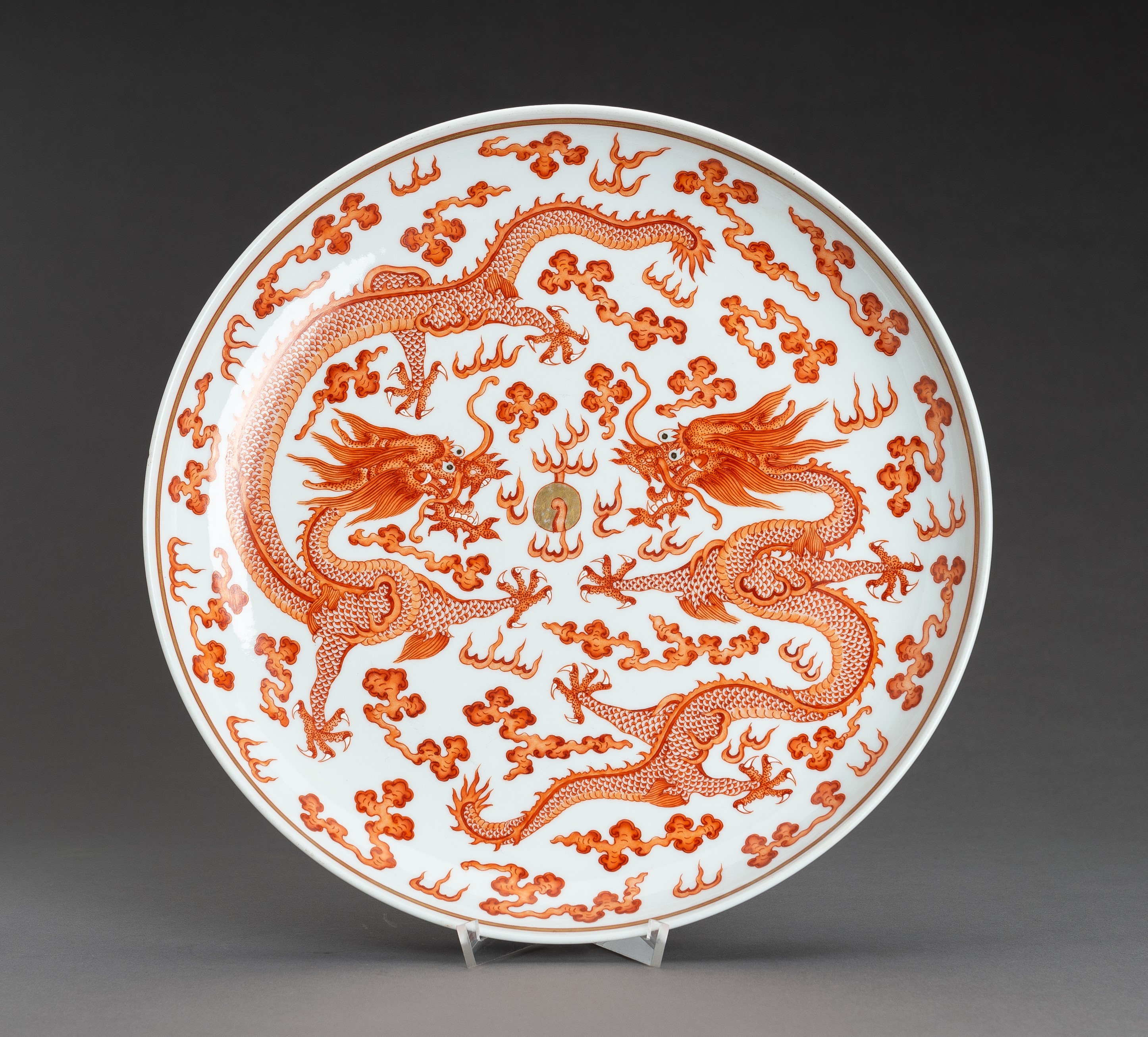 Lot 755 - A LARGE IRON-RED ‘DRAGONS’ PORCELAIN DISH