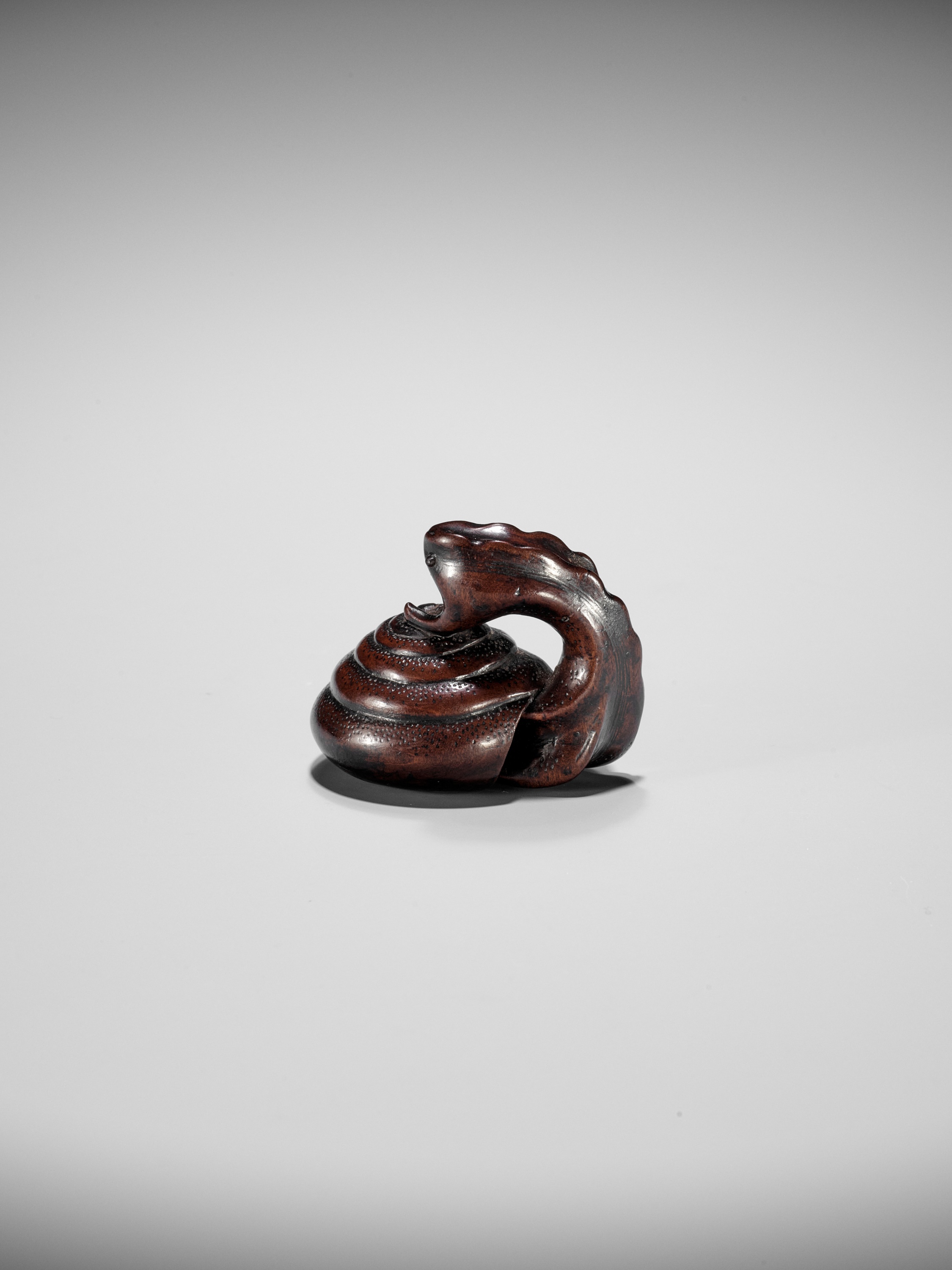 Lot 353 - SHUZAN: AN EXCEPTIONAL WOOD NETSUKE OF A