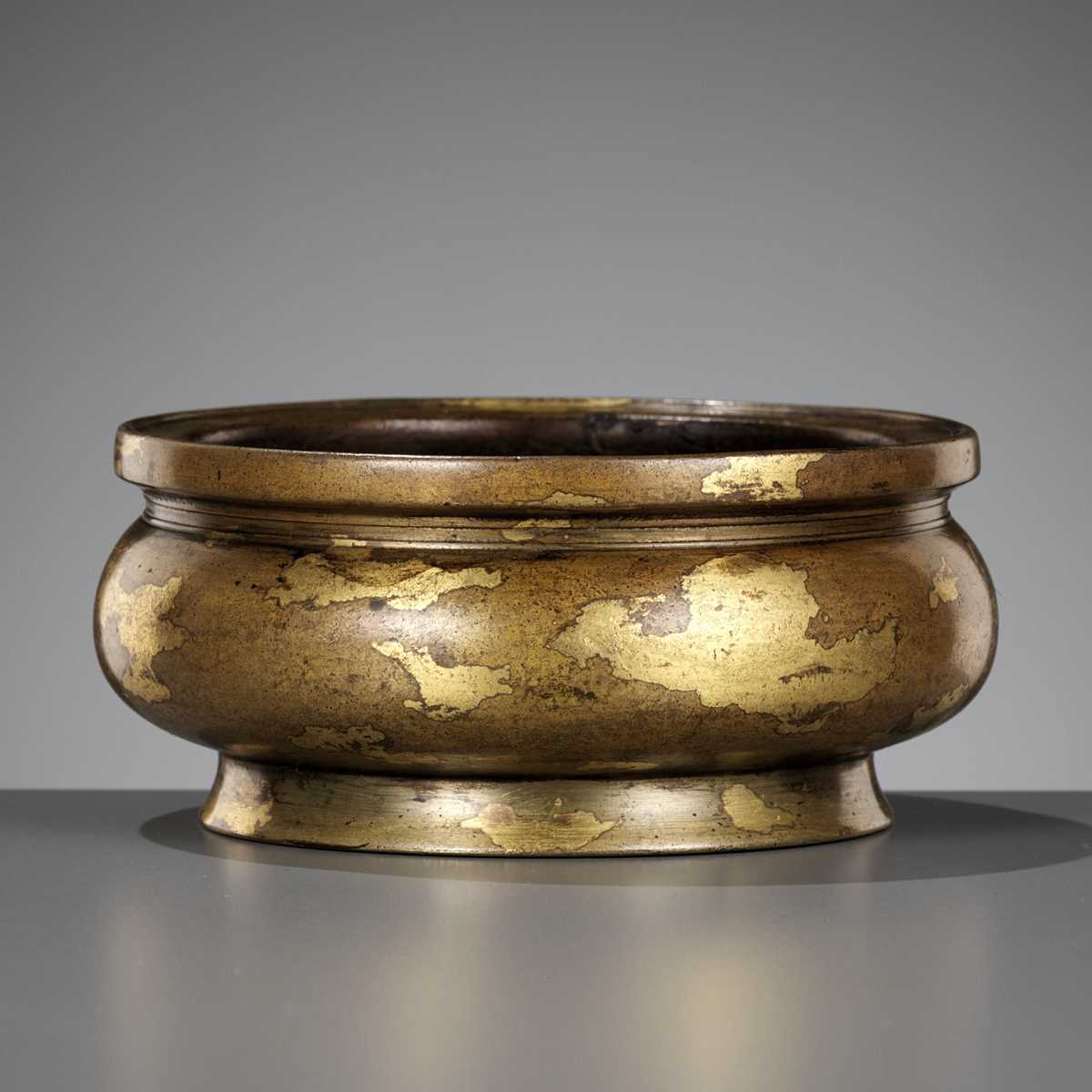 Lot 489 - A GILT-SPLASHED BRONZE CENSER, CHINA, 18TH