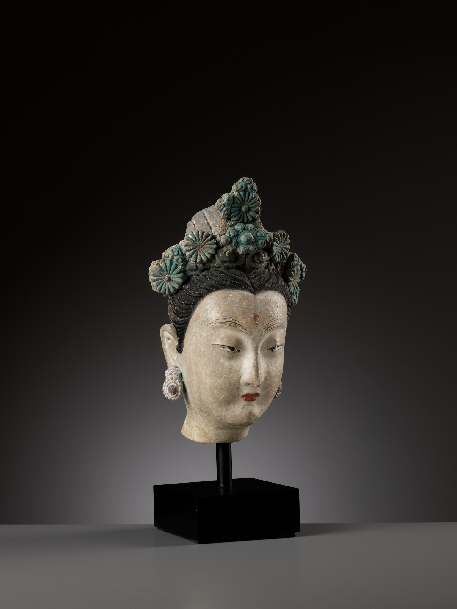 Lot 71 - A POLYCHROME STUCCO HEAD OF A NOBLE DAOIST