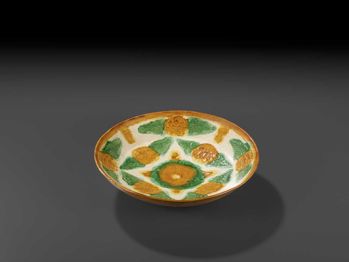 Lot 355 - A SANCAI-GLAZED ‘FLORAL’ DISH, LIAO DYNASTY