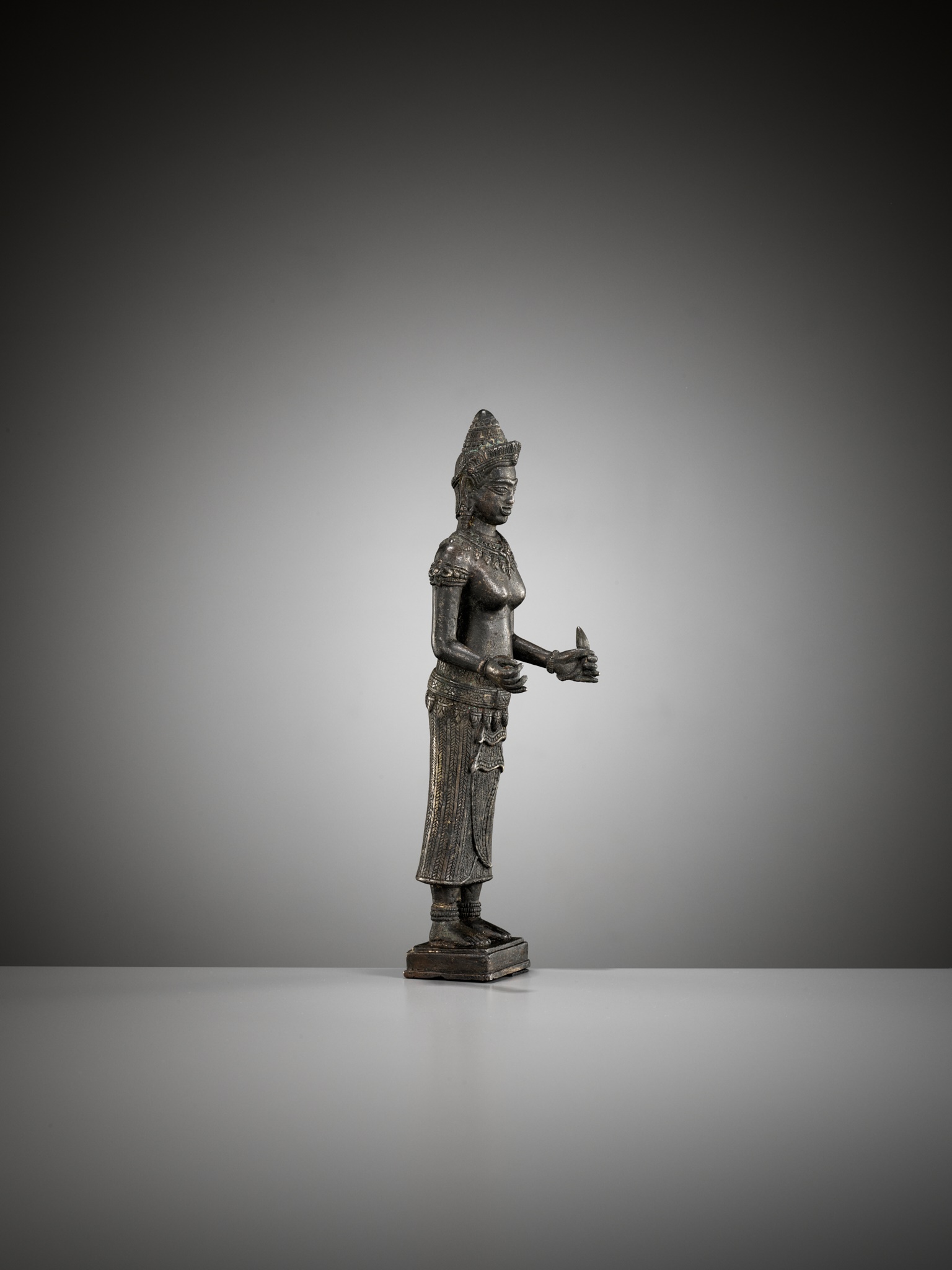 Lot 222 - A BRONZE FIGURE OF THE GODDESS UMA, KHMER,