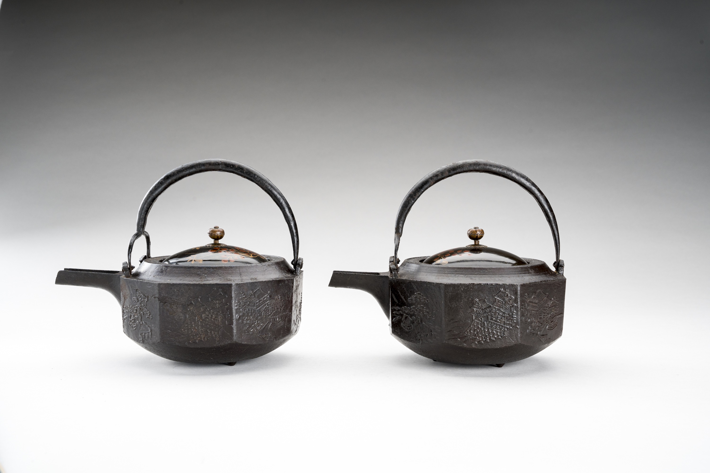 Lot 1154 - A PAIR OF CAST IRON SAKE EWERS CHOSHI, EDO
