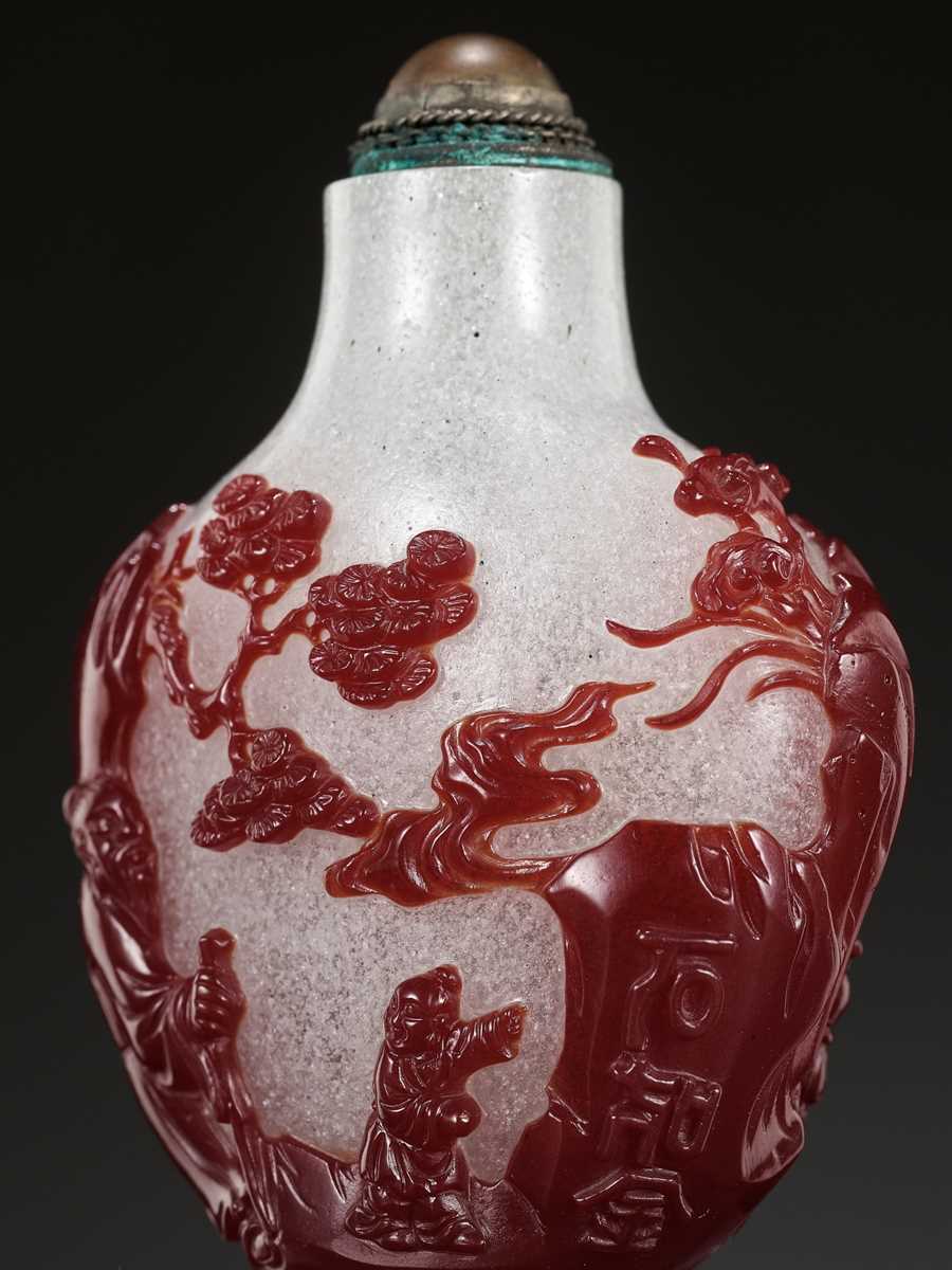 Lot 595 - A RUBY-RED OVERLAY SNOWFLAKE GLASS ‘SCHOLAR’