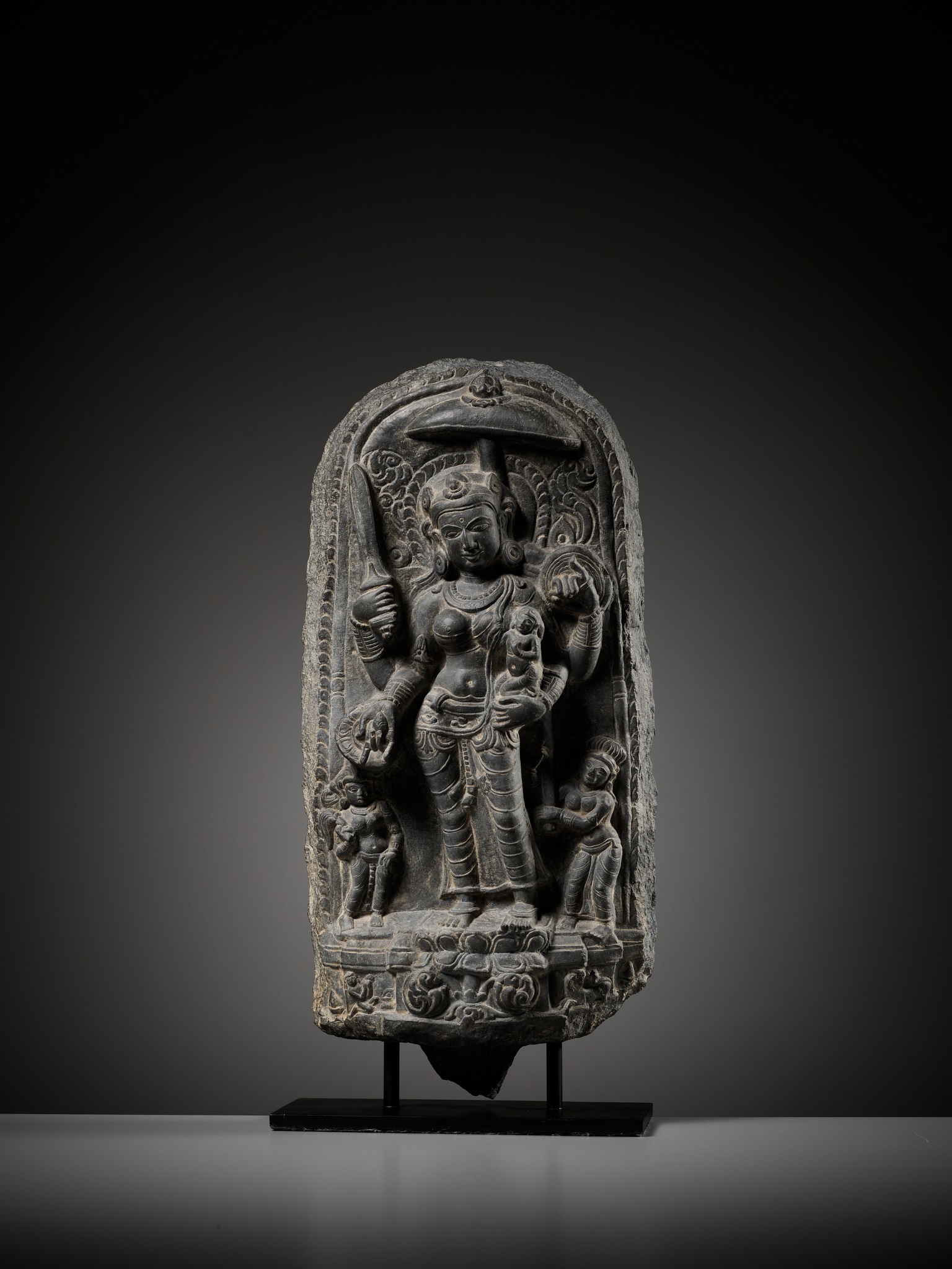 Lot 680 - A RARE BLACK STONE STELE OF PARVATI, PALA