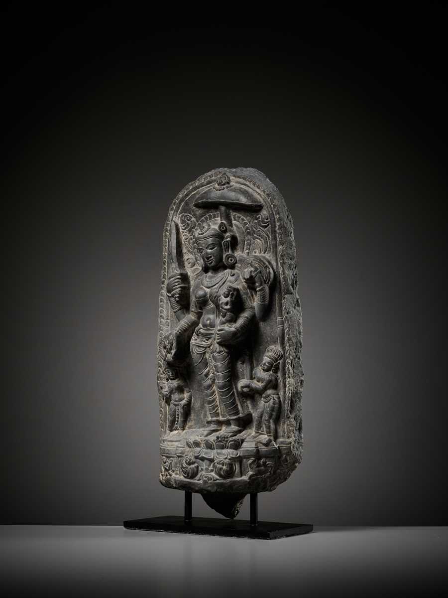 Lot 680 - A RARE BLACK STONE STELE OF PARVATI, PALA