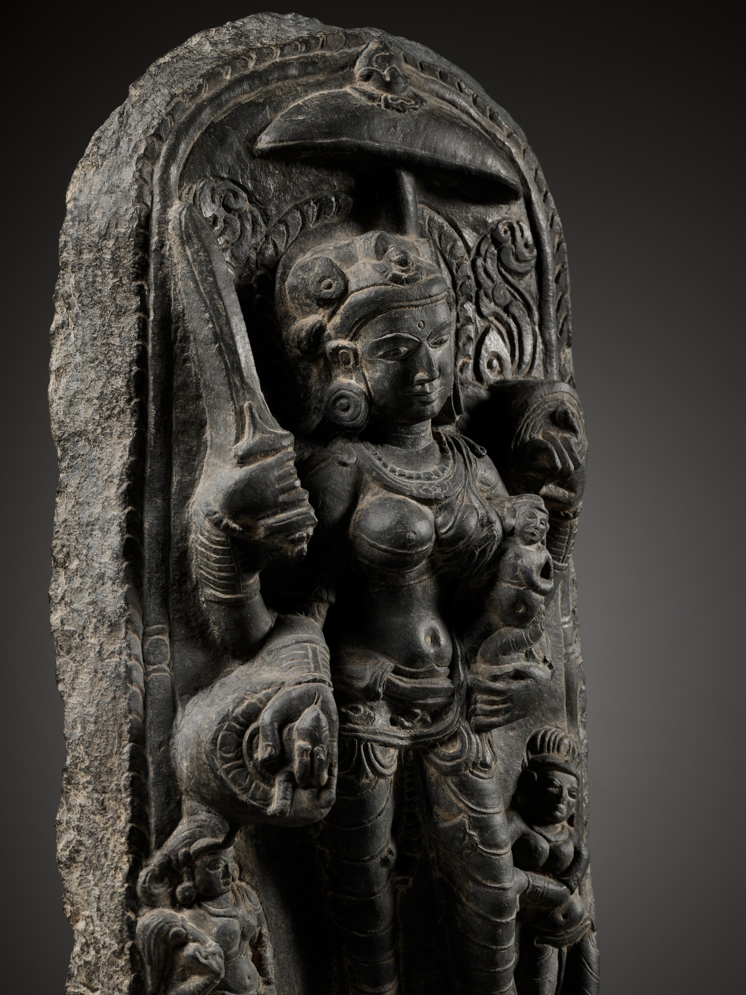 Lot 680 - A RARE BLACK STONE STELE OF PARVATI, PALA