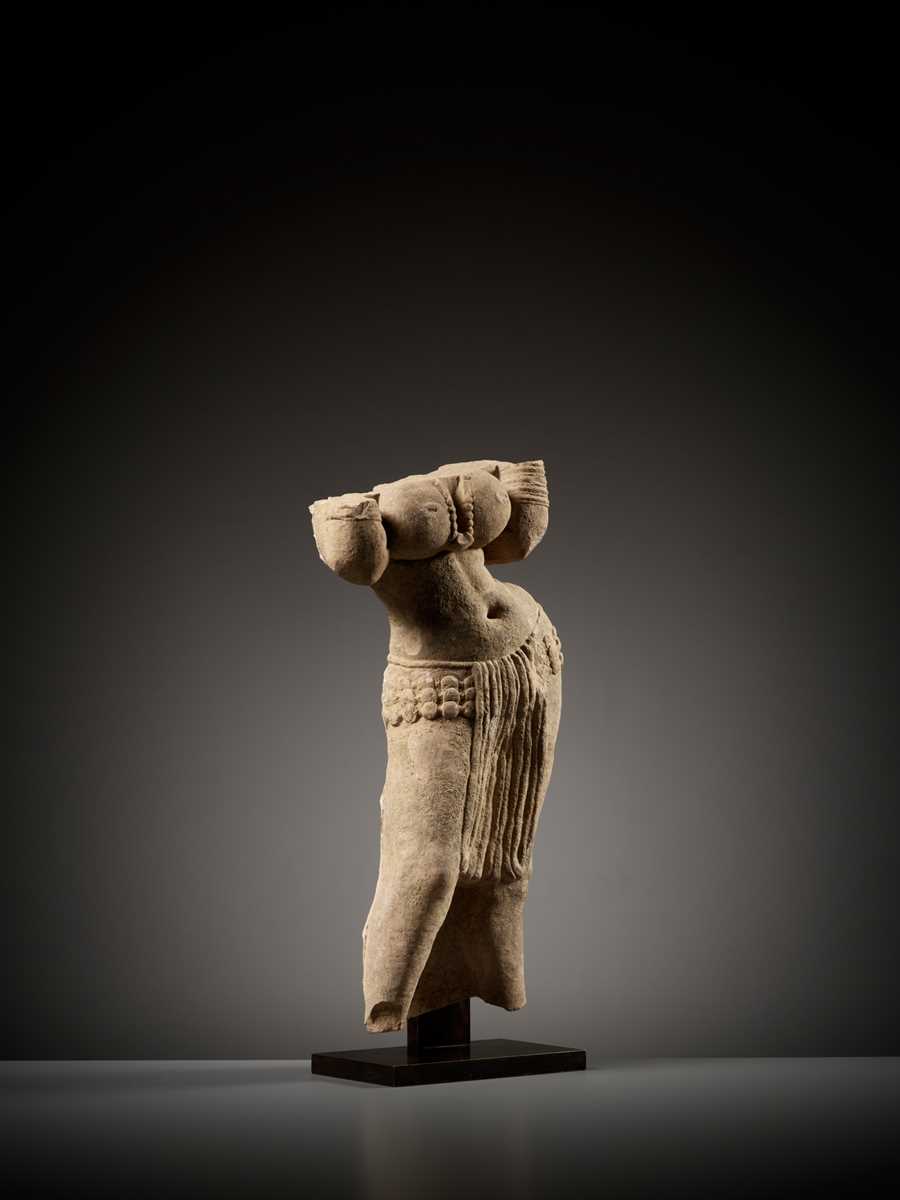 Lot 187 - A SANDSTONE TORSO OF A YAKSHI, INDIA,