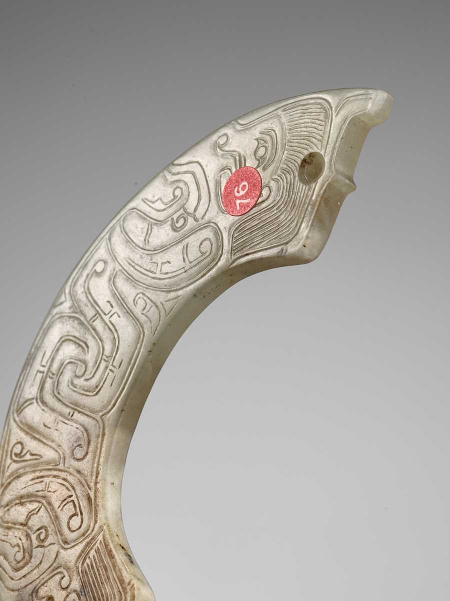 Lot 61 - A SMALL PALE CELADON JADE ‘HUMAN FIGURE’