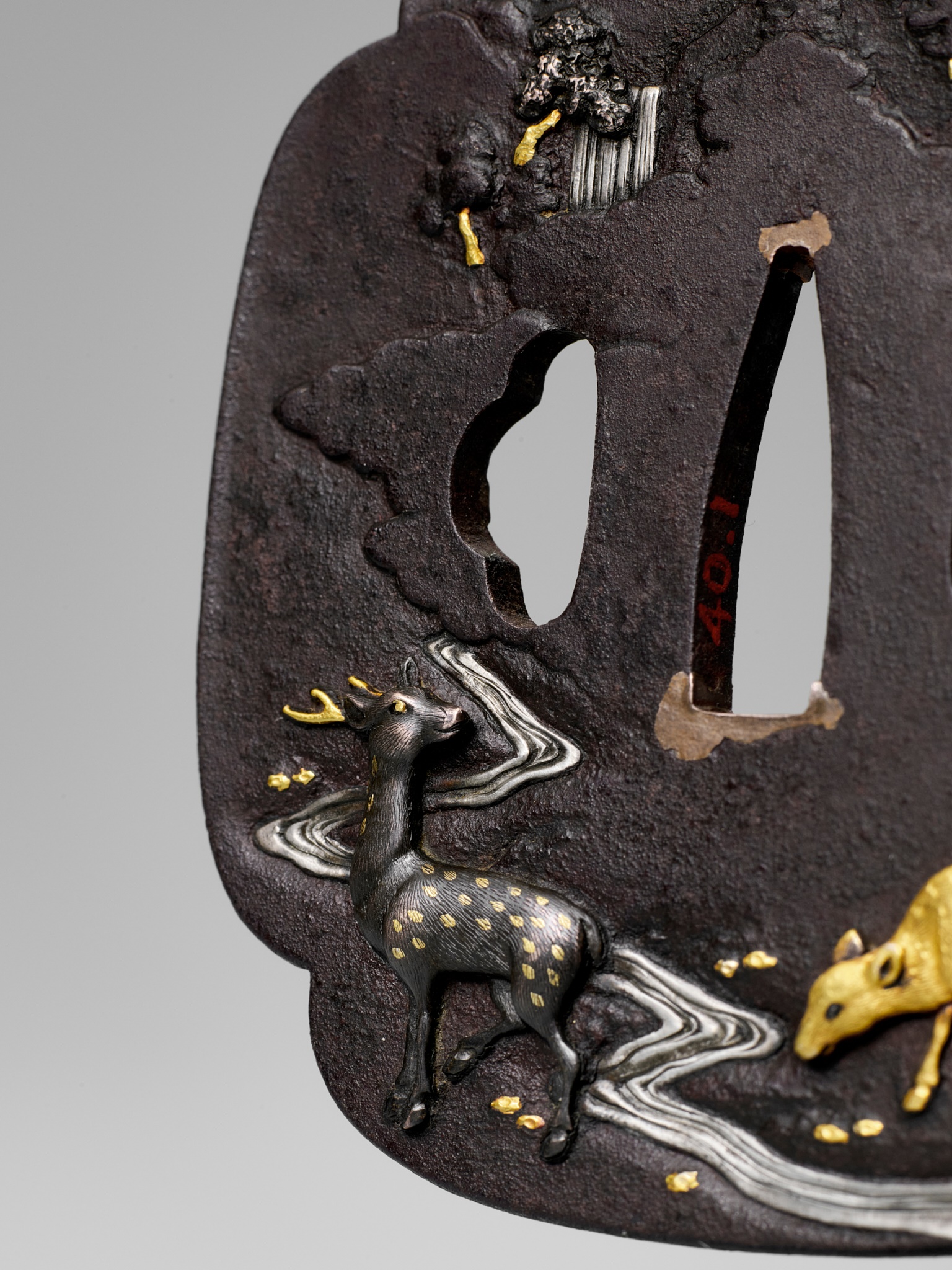 Lot 205 - SHOZUI: A HAMANO SCHOOL IRON TSUBA WITH DEER,