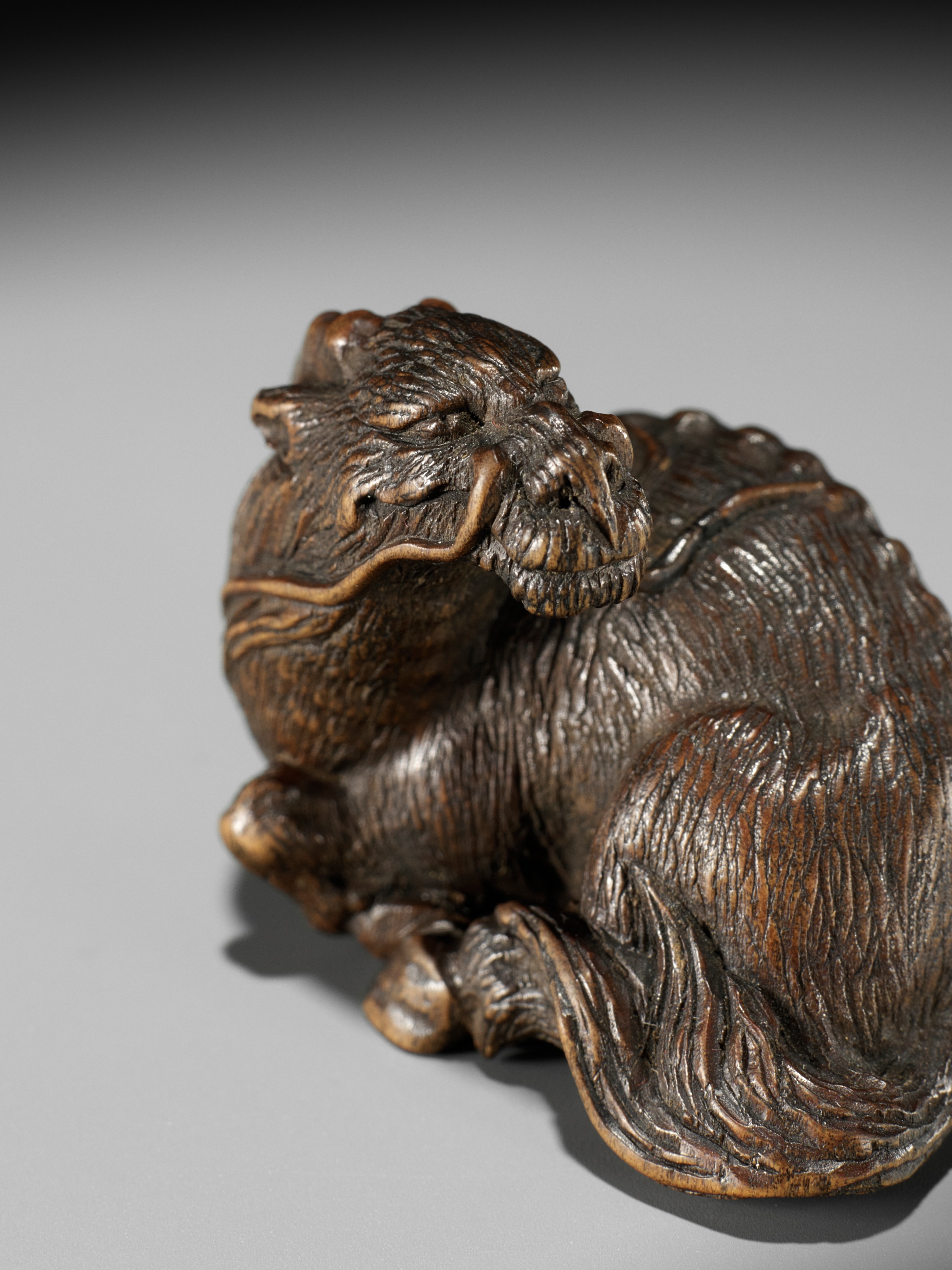 Lot 72 - ICHIYU: A SUPERB NAGOYA SCHOOL WOOD NETSUKE